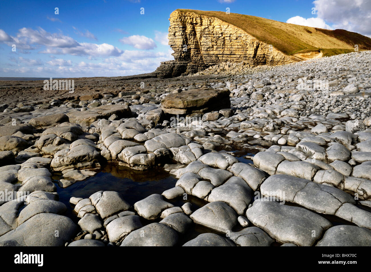 Cliffs at Nash point in South Wales viewed from the rocky Limestone and ...