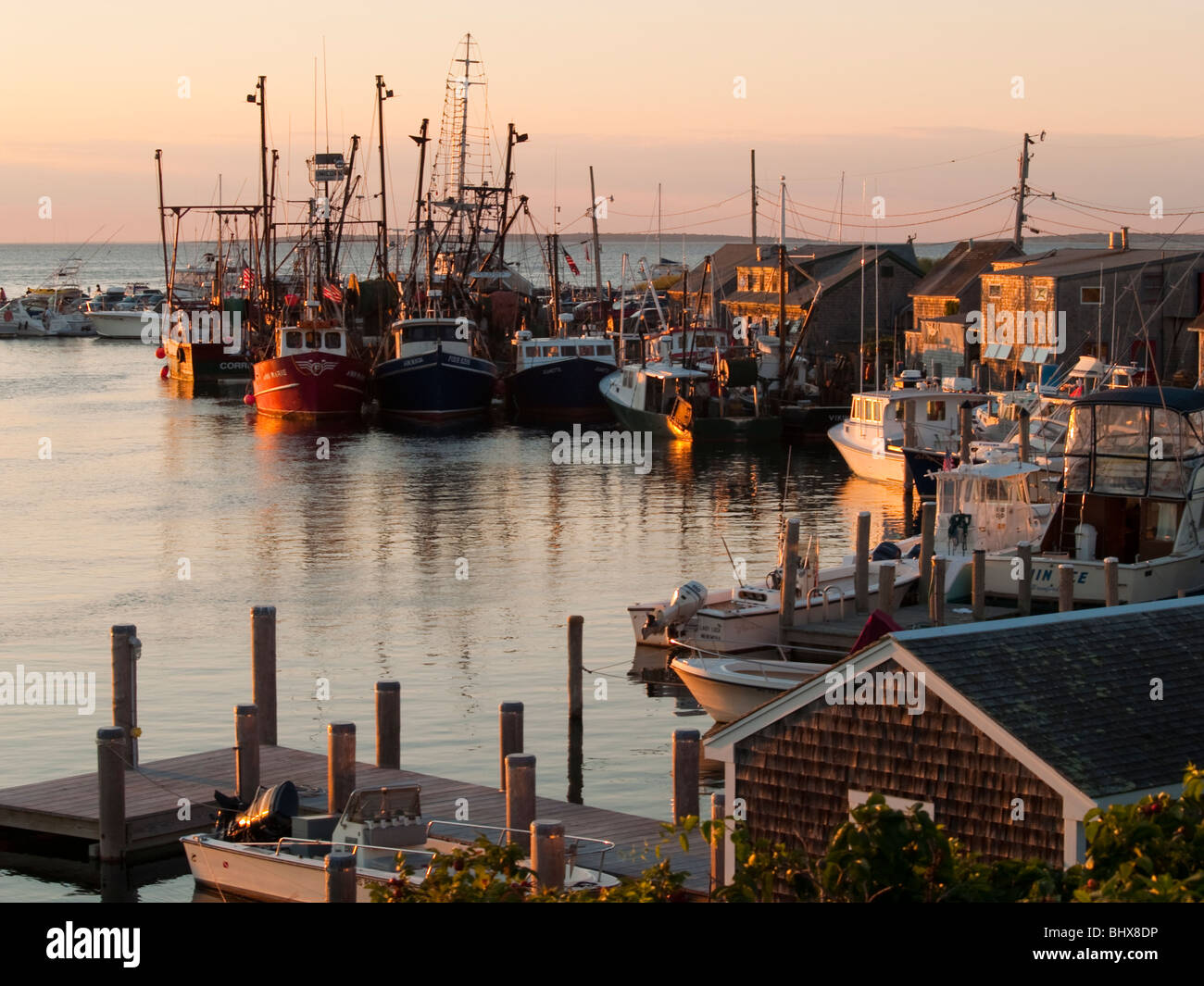 Sunset in the pretty fishing village of Menemsha on Martha's Vineyard ...