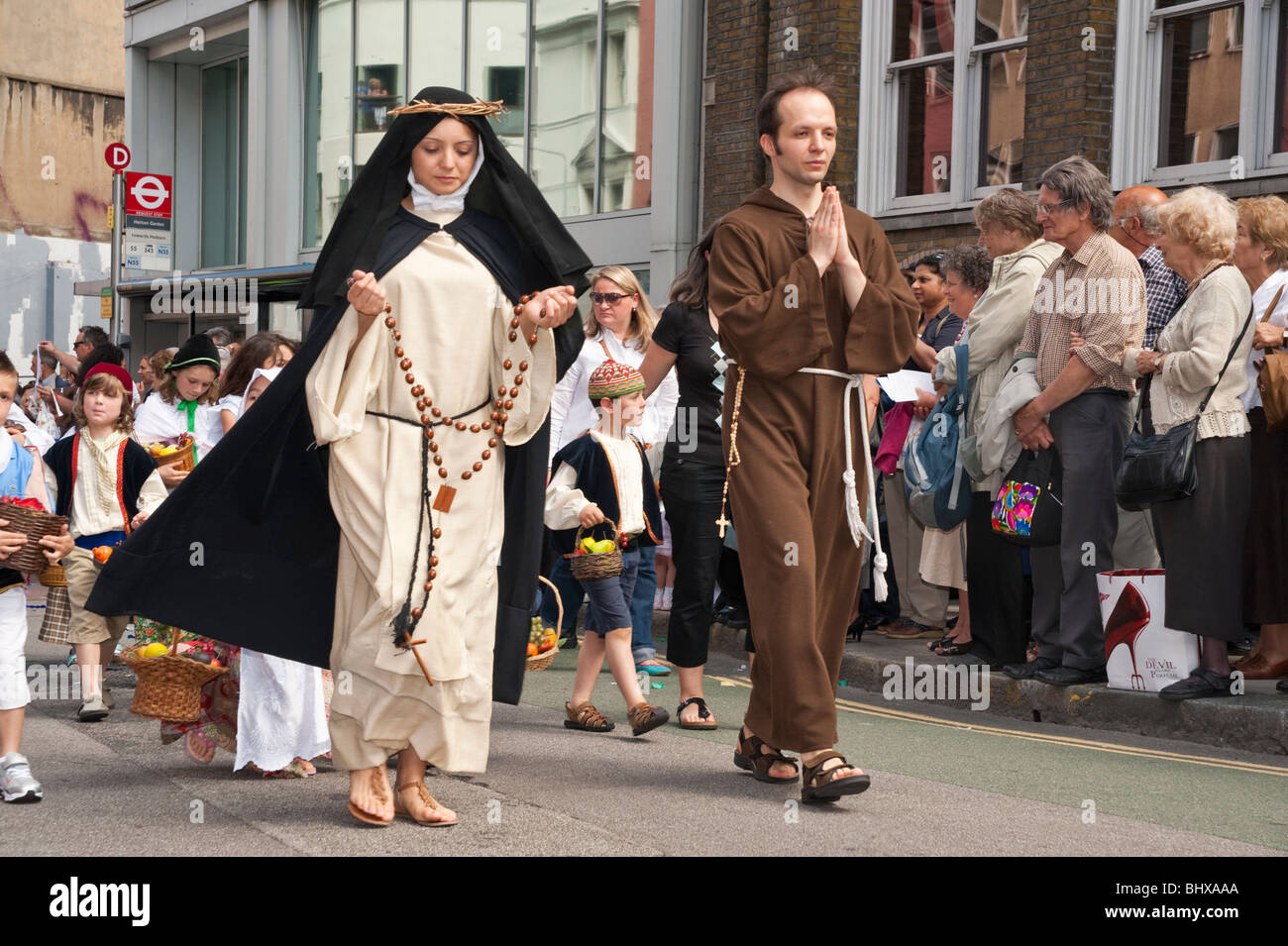 Crowds watch procession in Honour of Our Lady of Mount Carmel on main ...