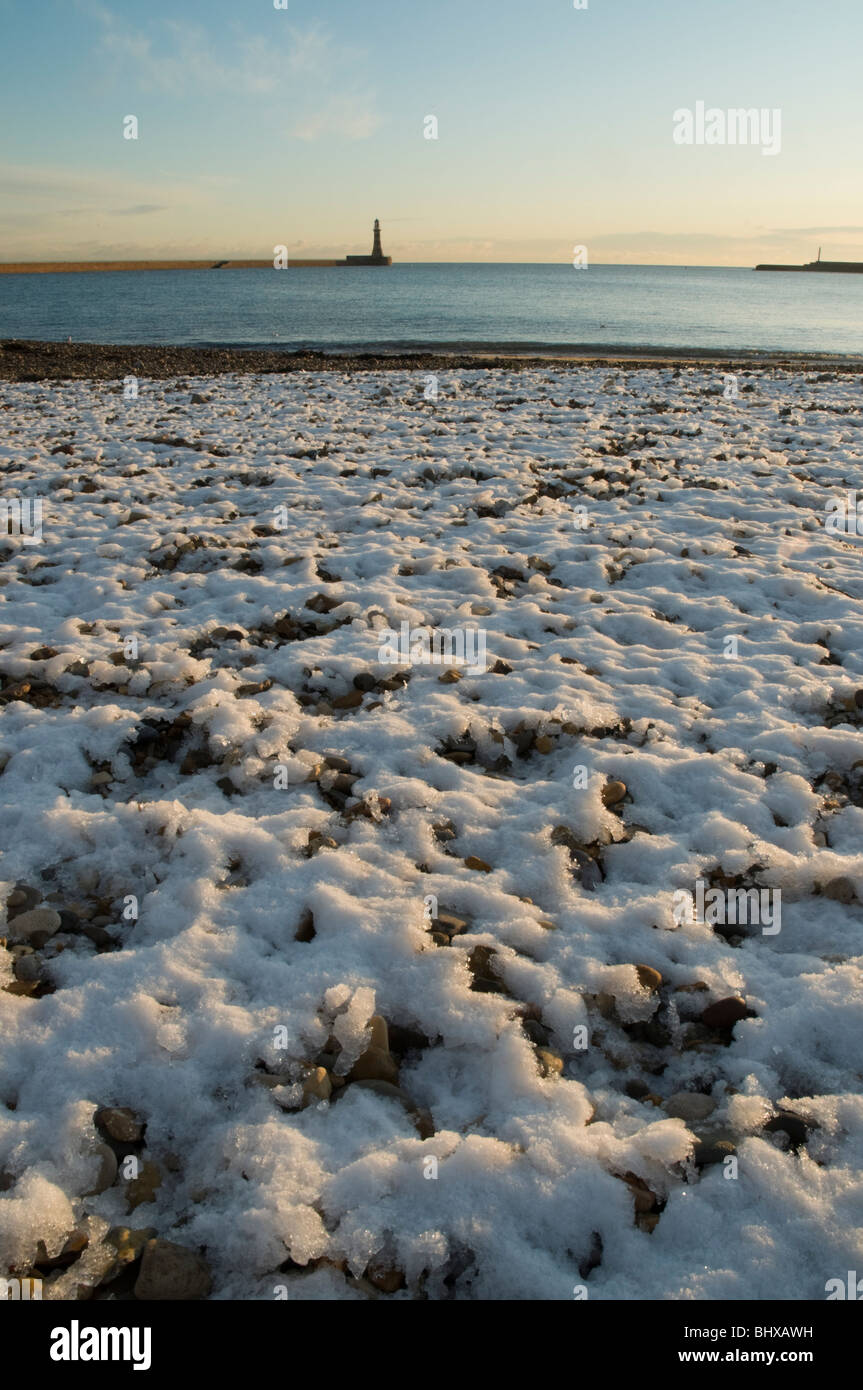 Snow on the beach Stock Photo - Alamy