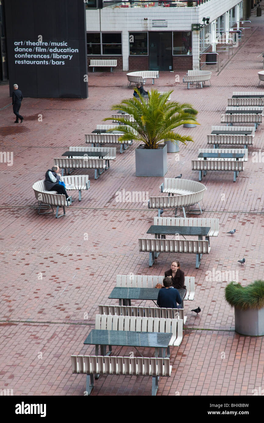 Lunch time and seating and tables outside a waterside café in the ...