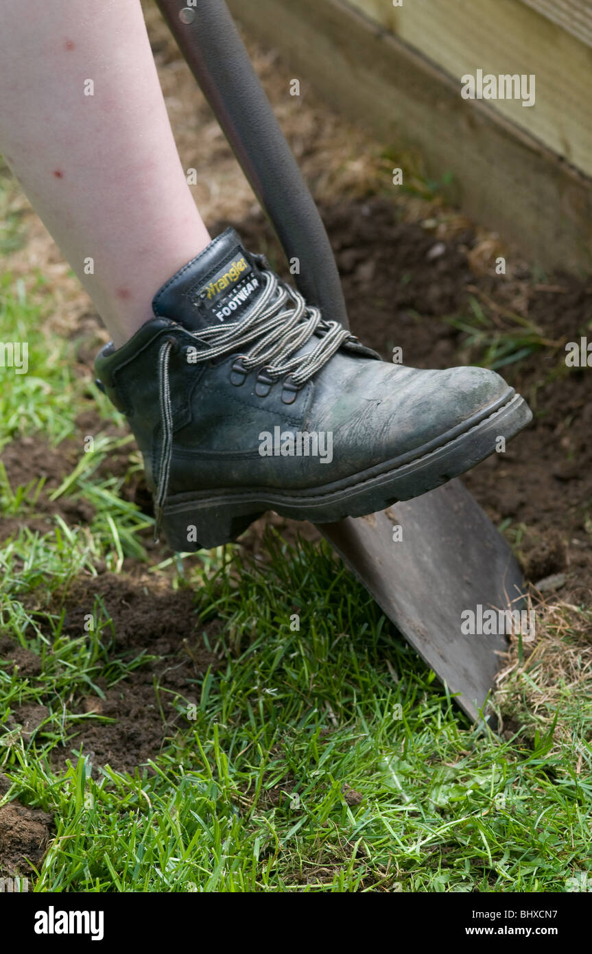 Digging in Garden Stock Photo - Alamy