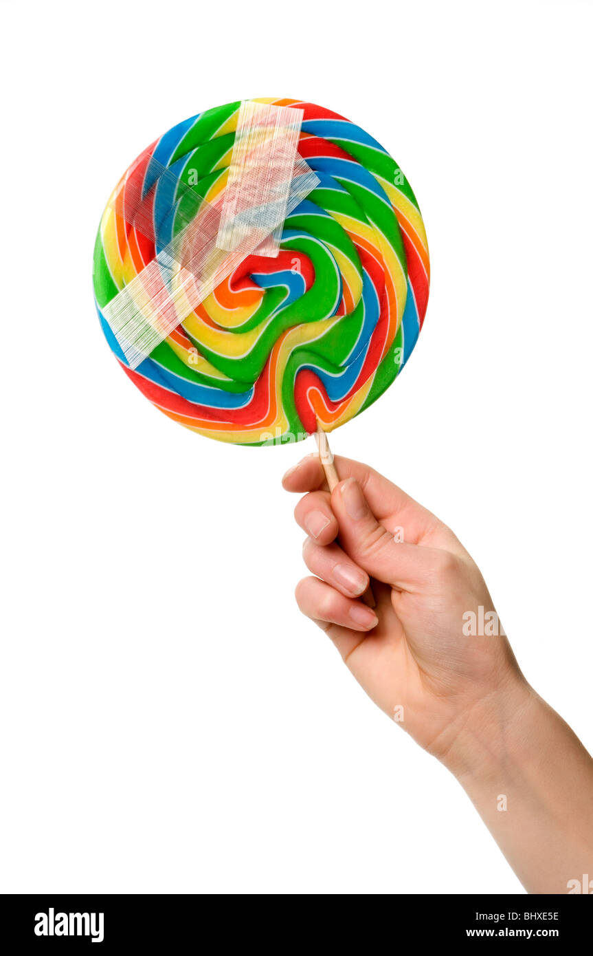hand and candy sucker Stock Photo - Alamy