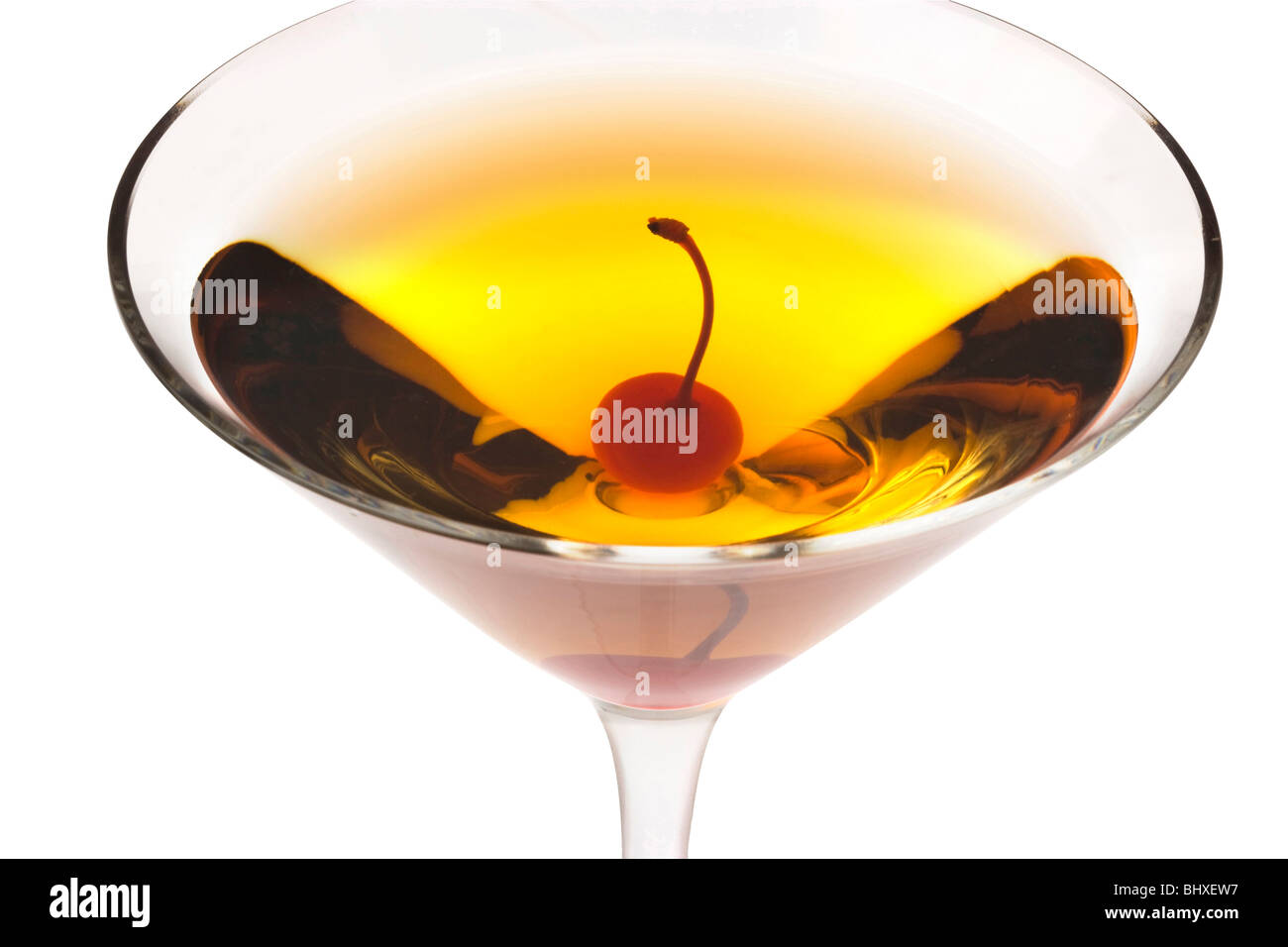 Rob Roy or Manhattan mixed drink with maraschino cherry close up on ...