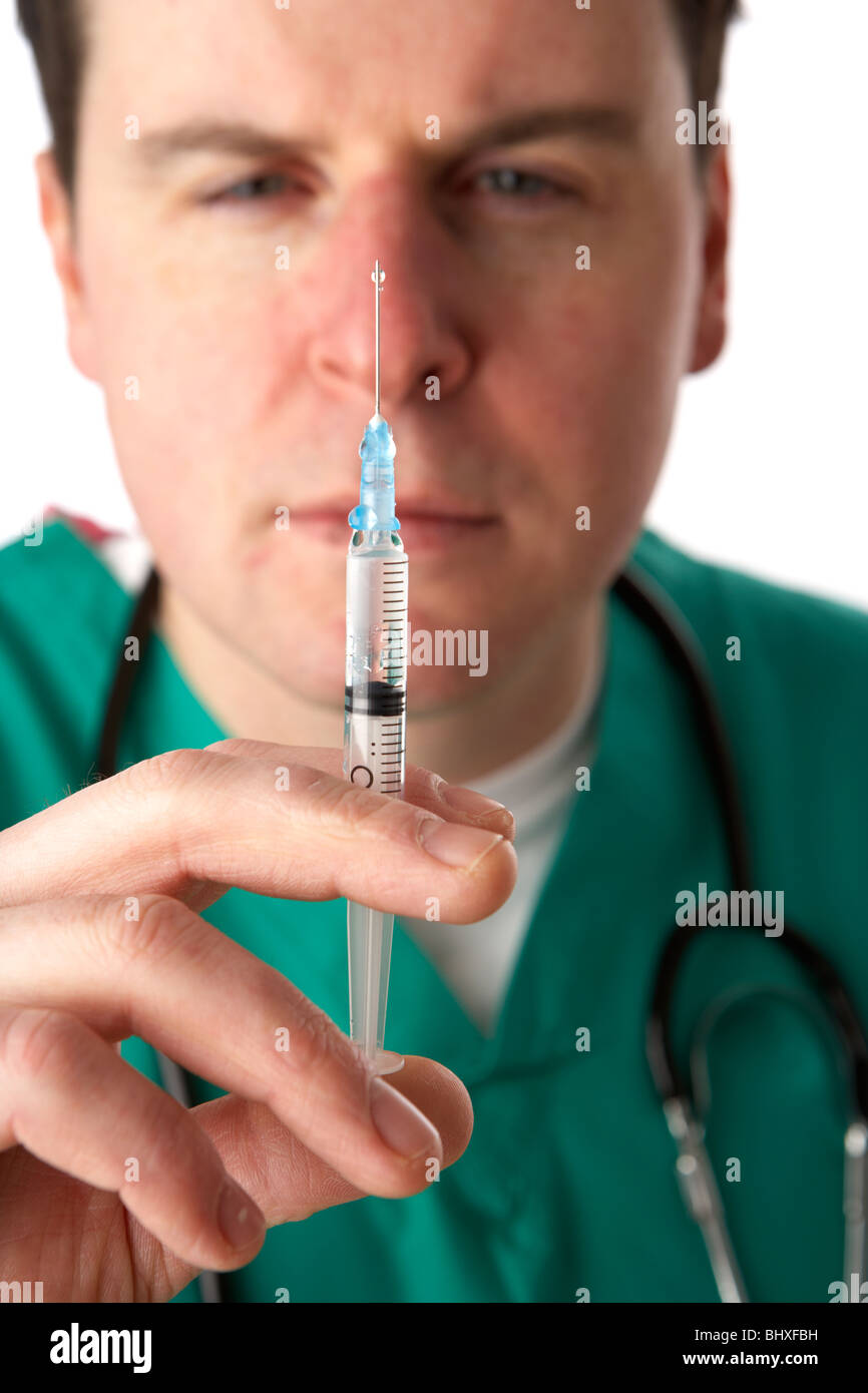 man wearing medical scrubs and stethoscope holding needle and syringe ...