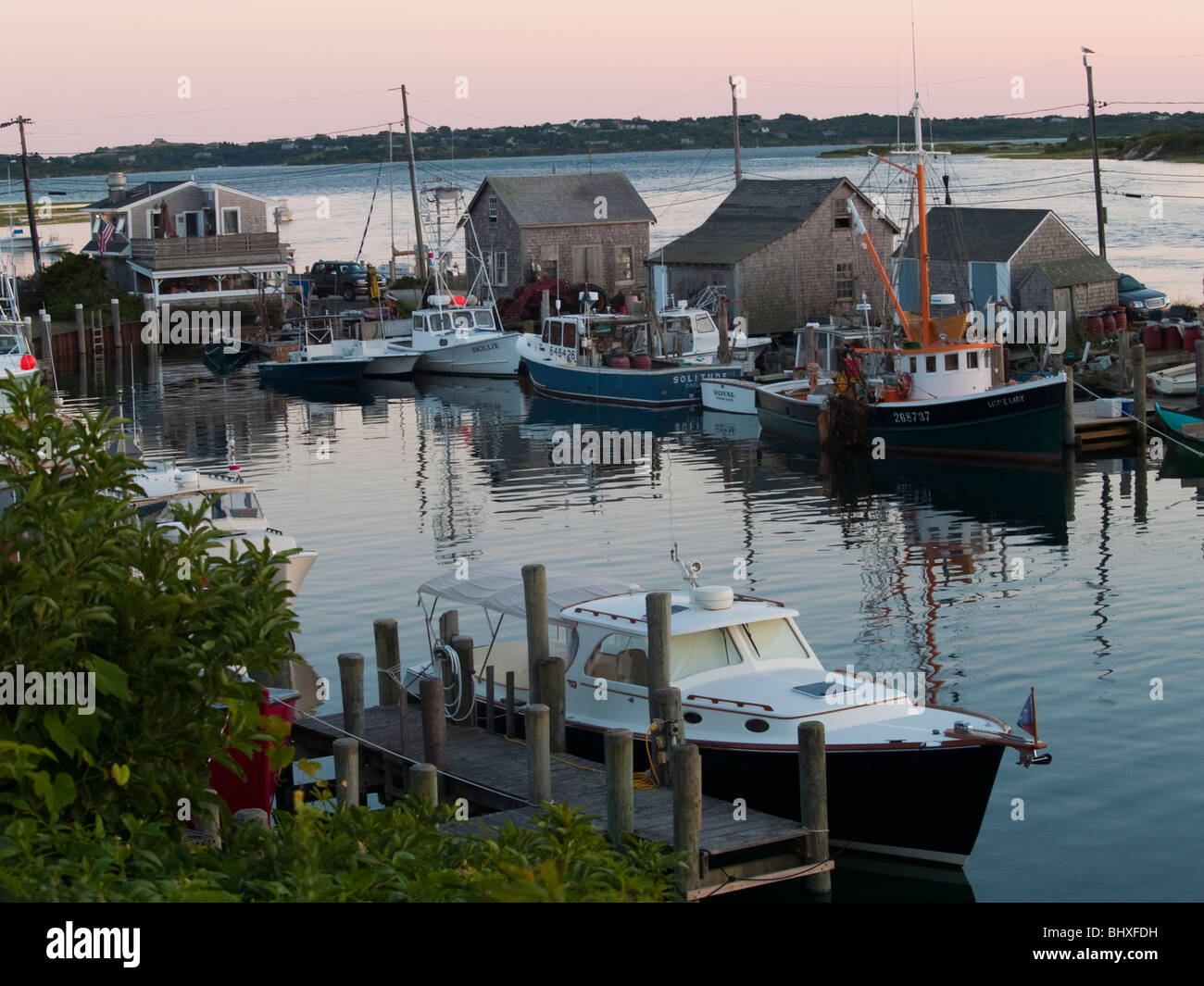 Sunset in the pretty fishing village of Menemsha, on Martha's Vineyard ...