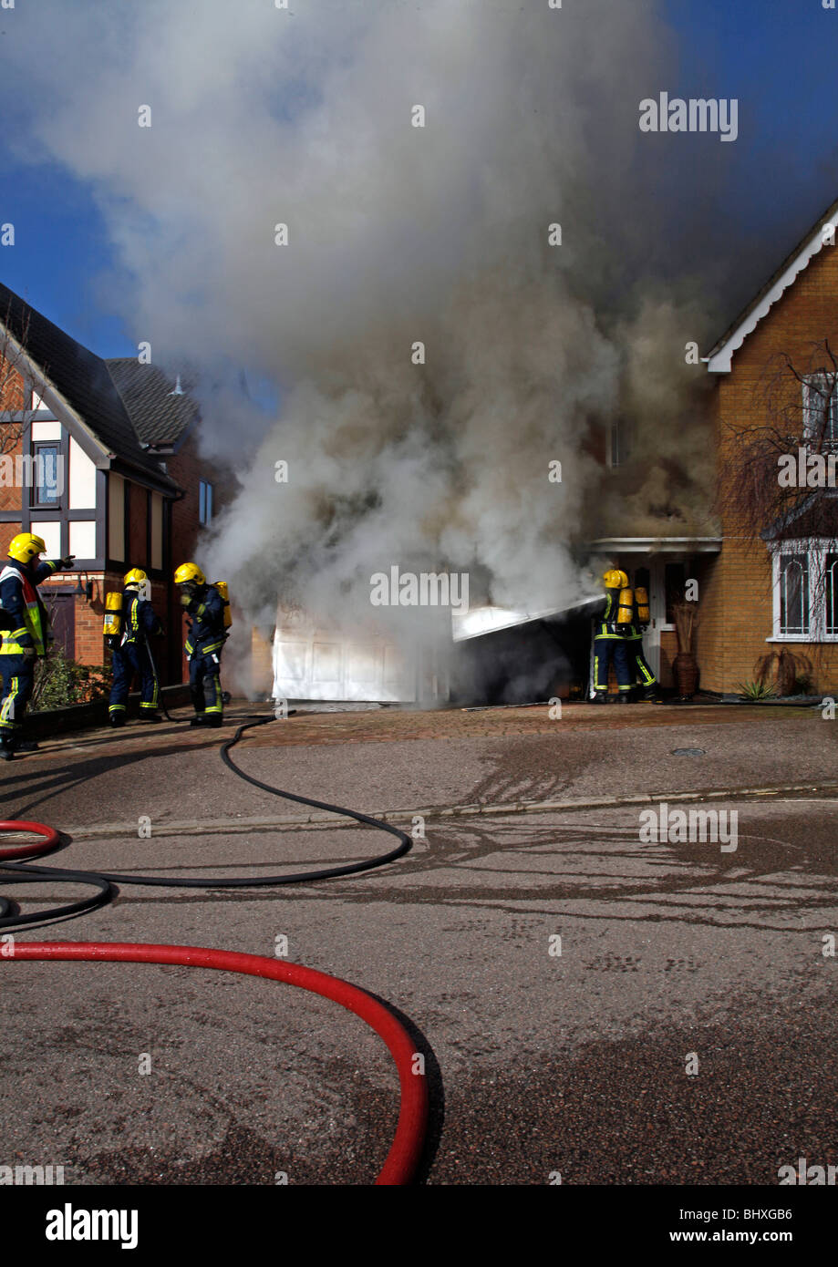 A domestic fire in a suburban neighbourhood in England, with fire ...