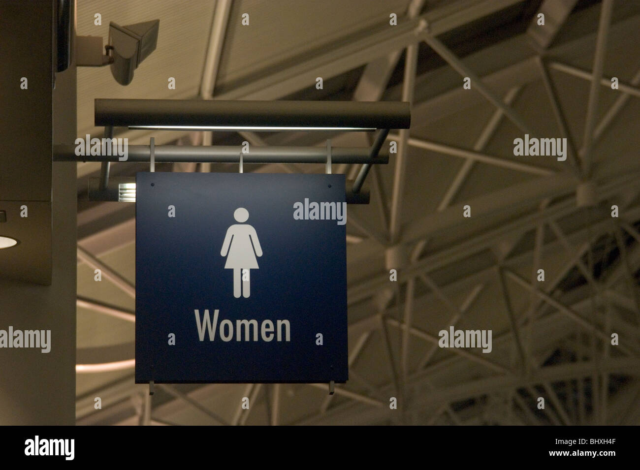 Hanging blue sign Stock Photo - Alamy