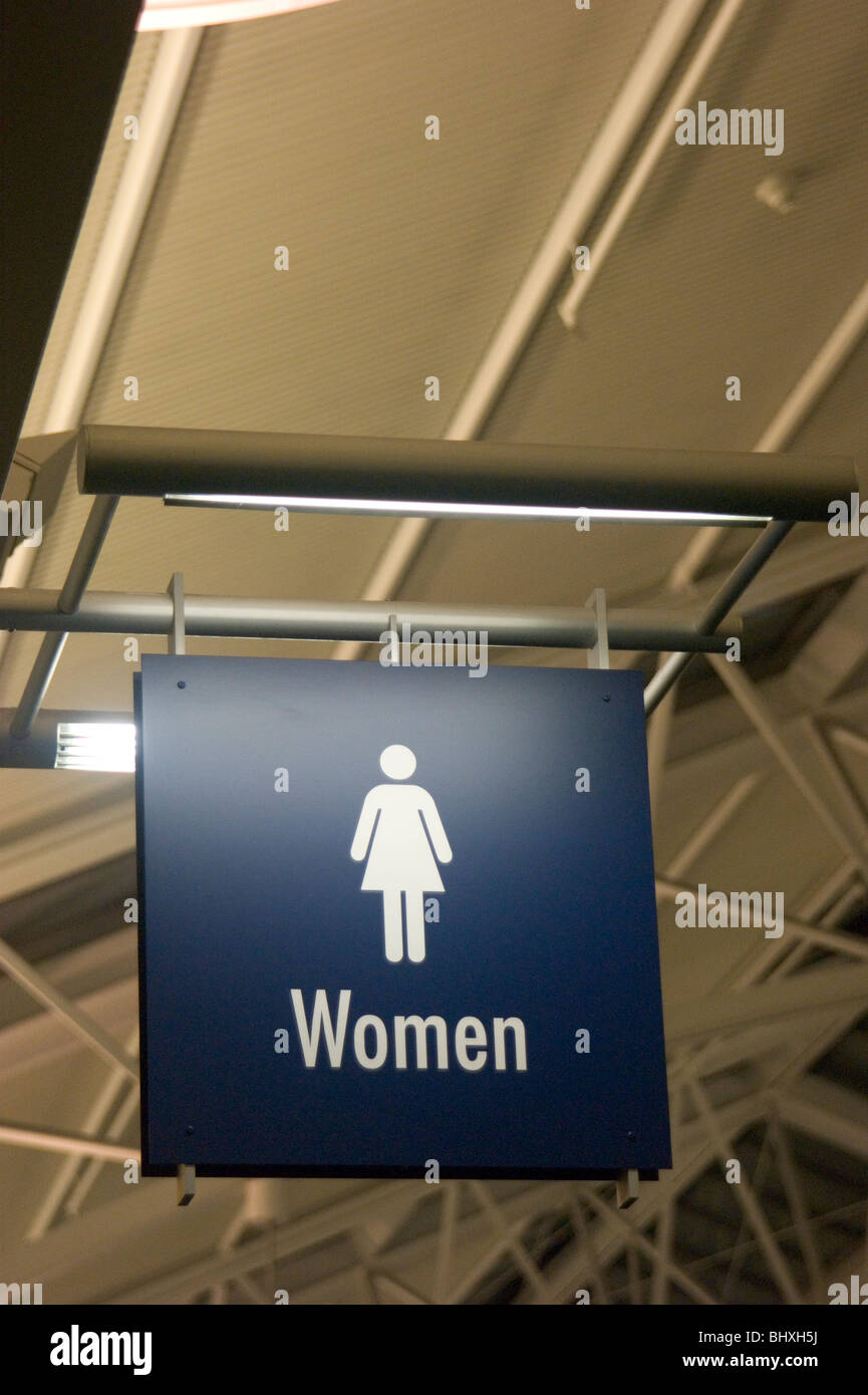 Hanging blue sign Stock Photo - Alamy