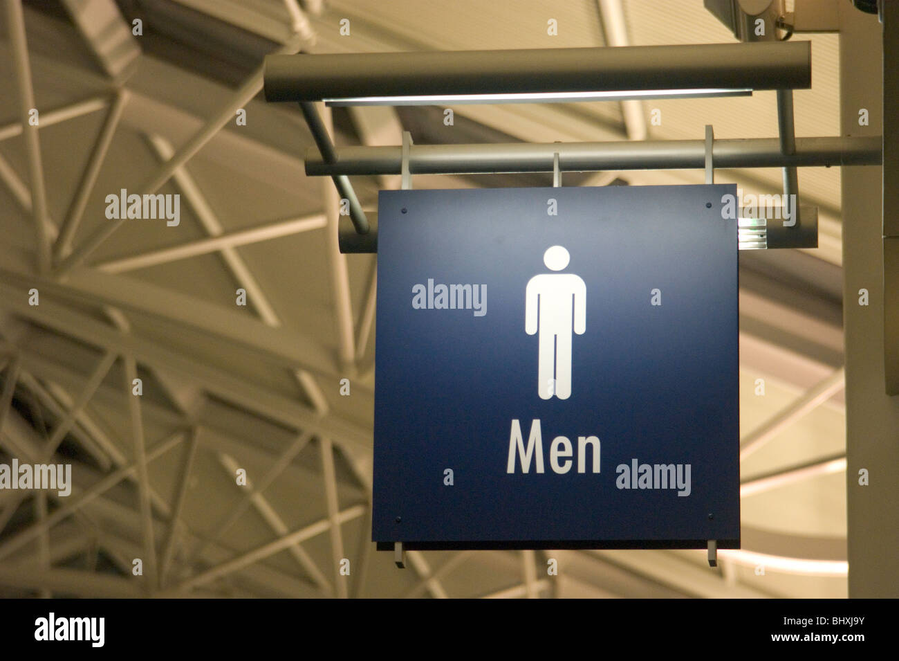 Hanging blue sign Stock Photo - Alamy