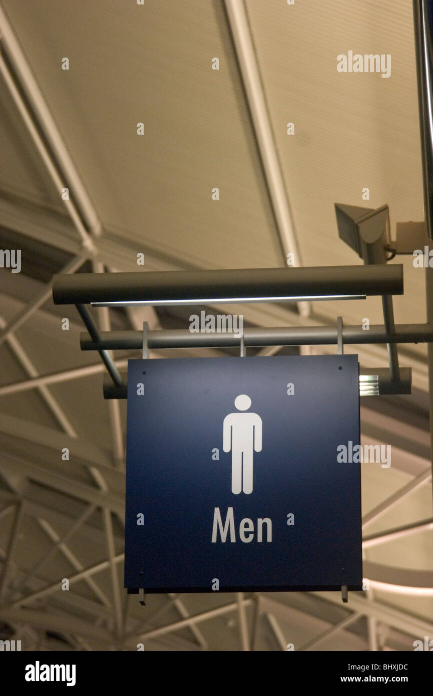 Hanging blue sign Stock Photo - Alamy