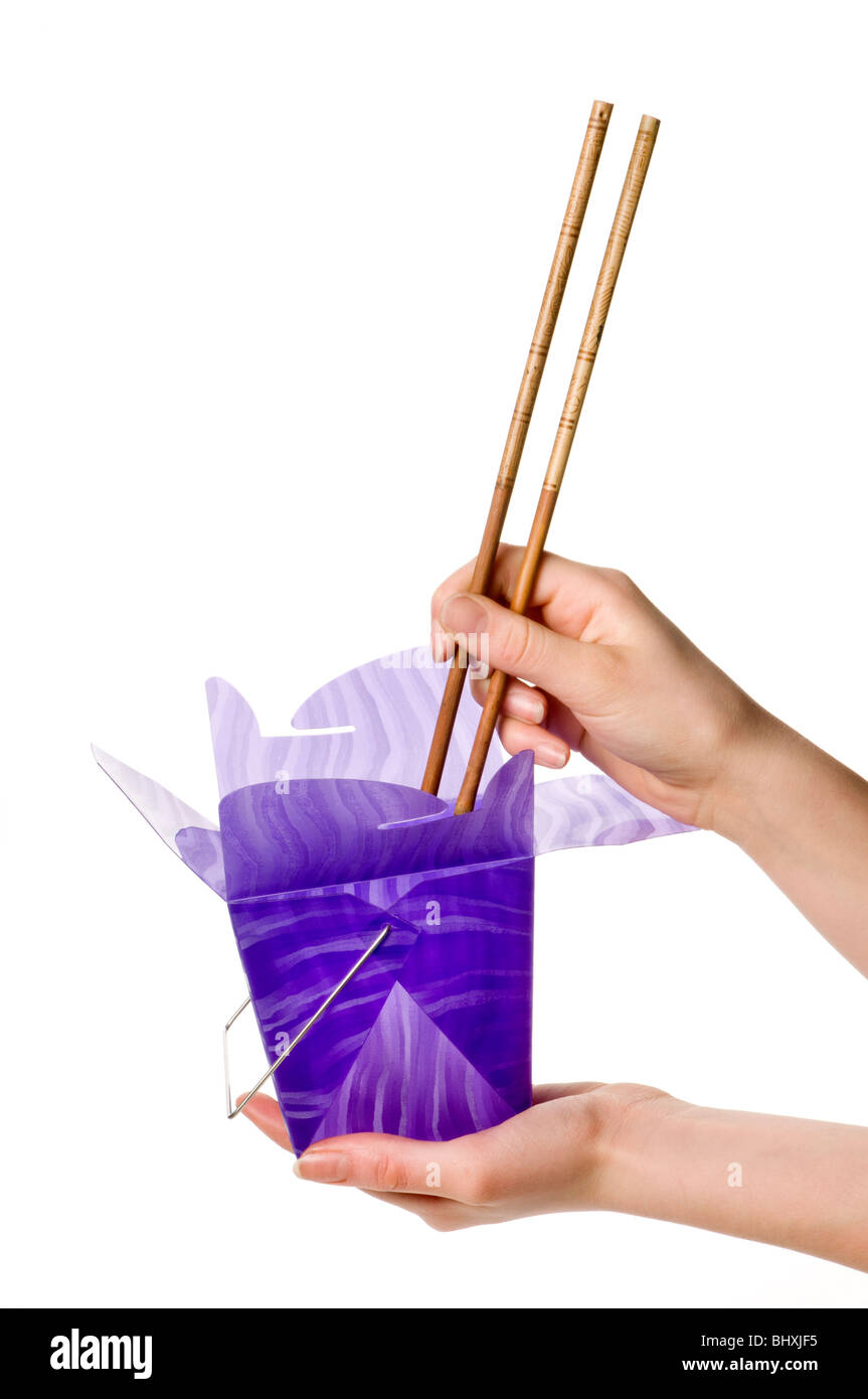Holding white takeout container Cut Out Stock Images & Pictures - Alamy
