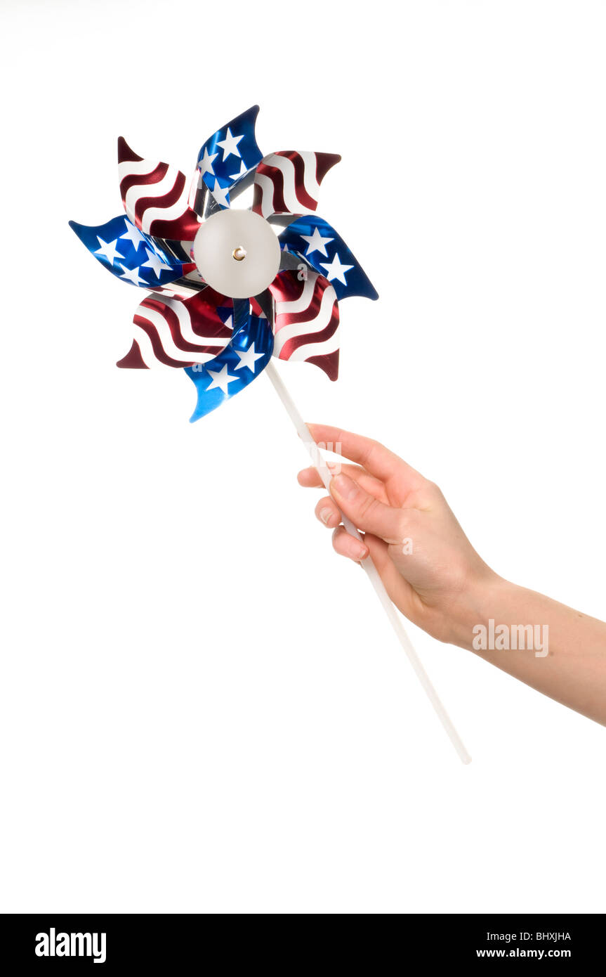 hand and pin wheel Stock Photo - Alamy