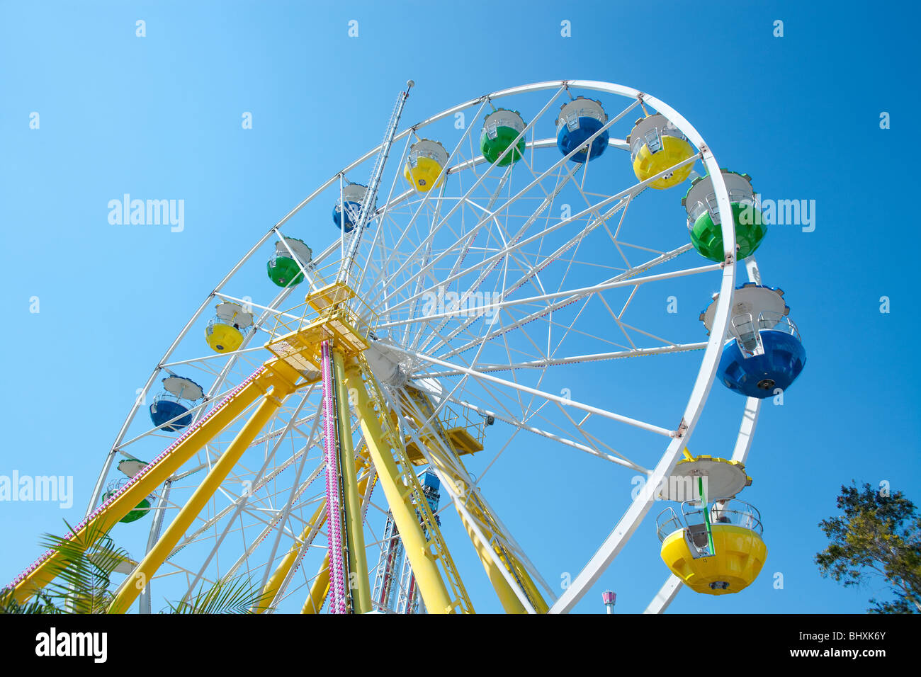 Ferris Wheel at amusement park Stock Photo - Alamy