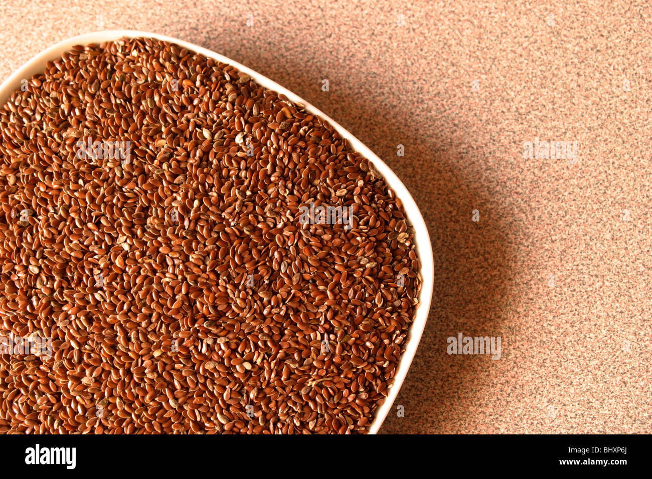 Flax seed in a plate Stock Photo - Alamy