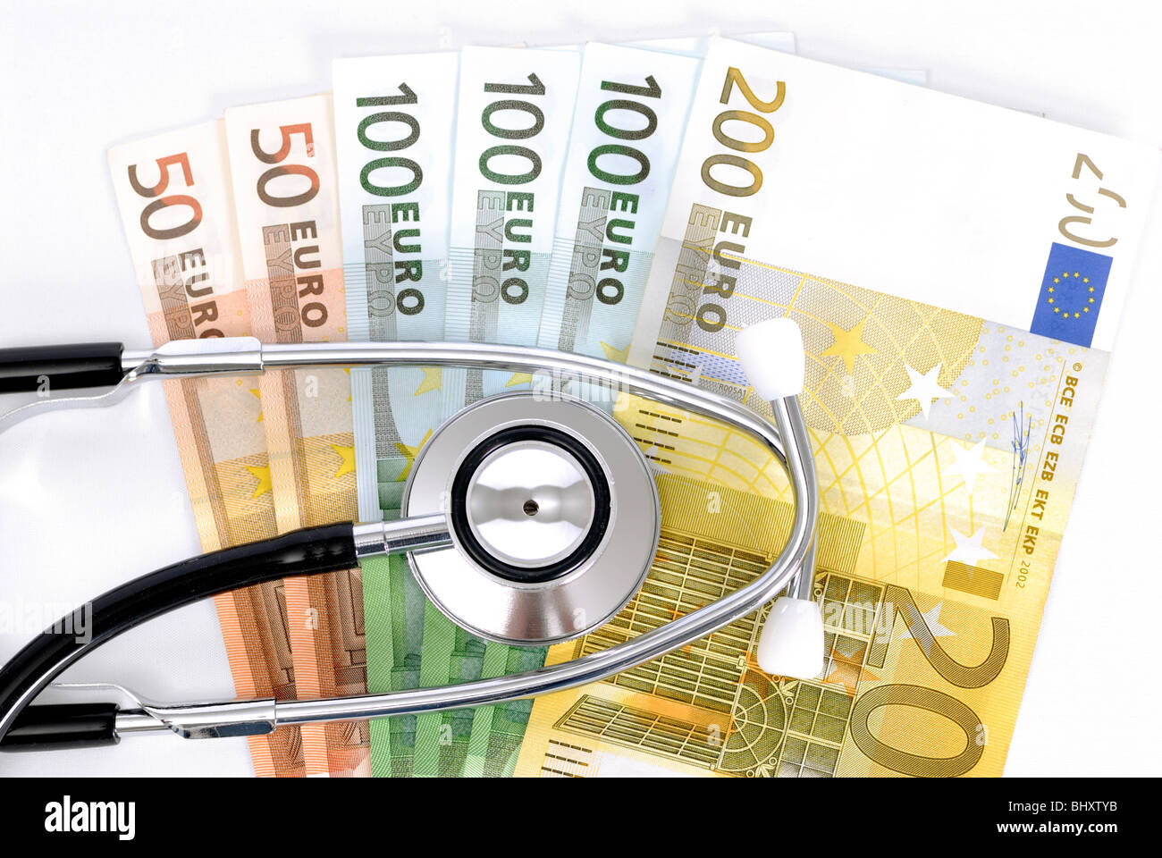 Stethoscope and money Symbolfoto medical costs, Health funds Stock ...