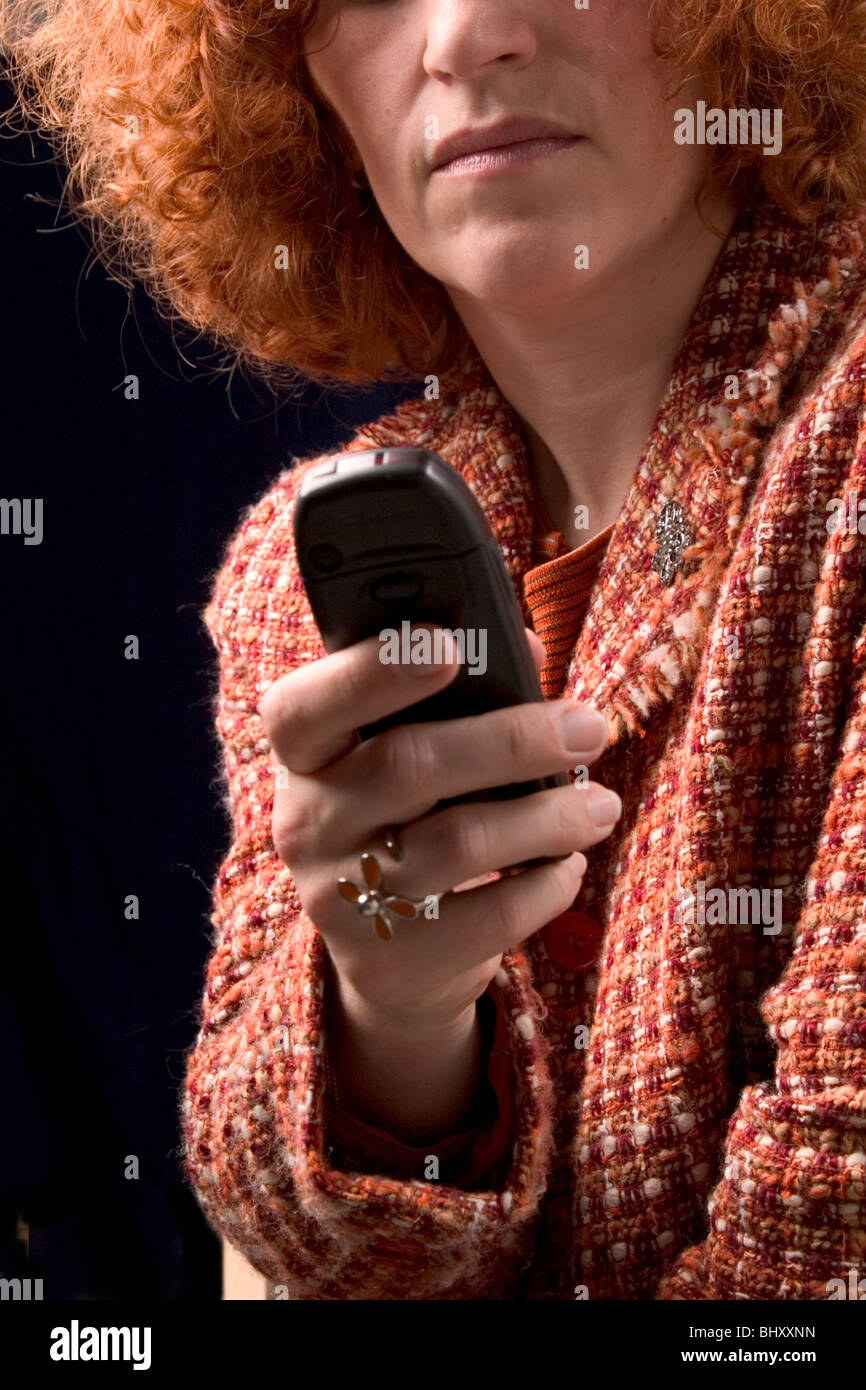 woman with handy Stock Photo - Alamy