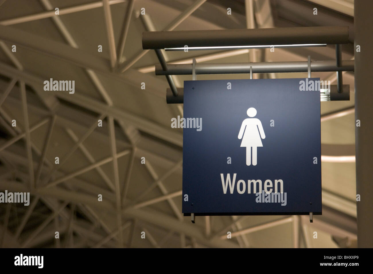 Hanging blue sign Stock Photo - Alamy