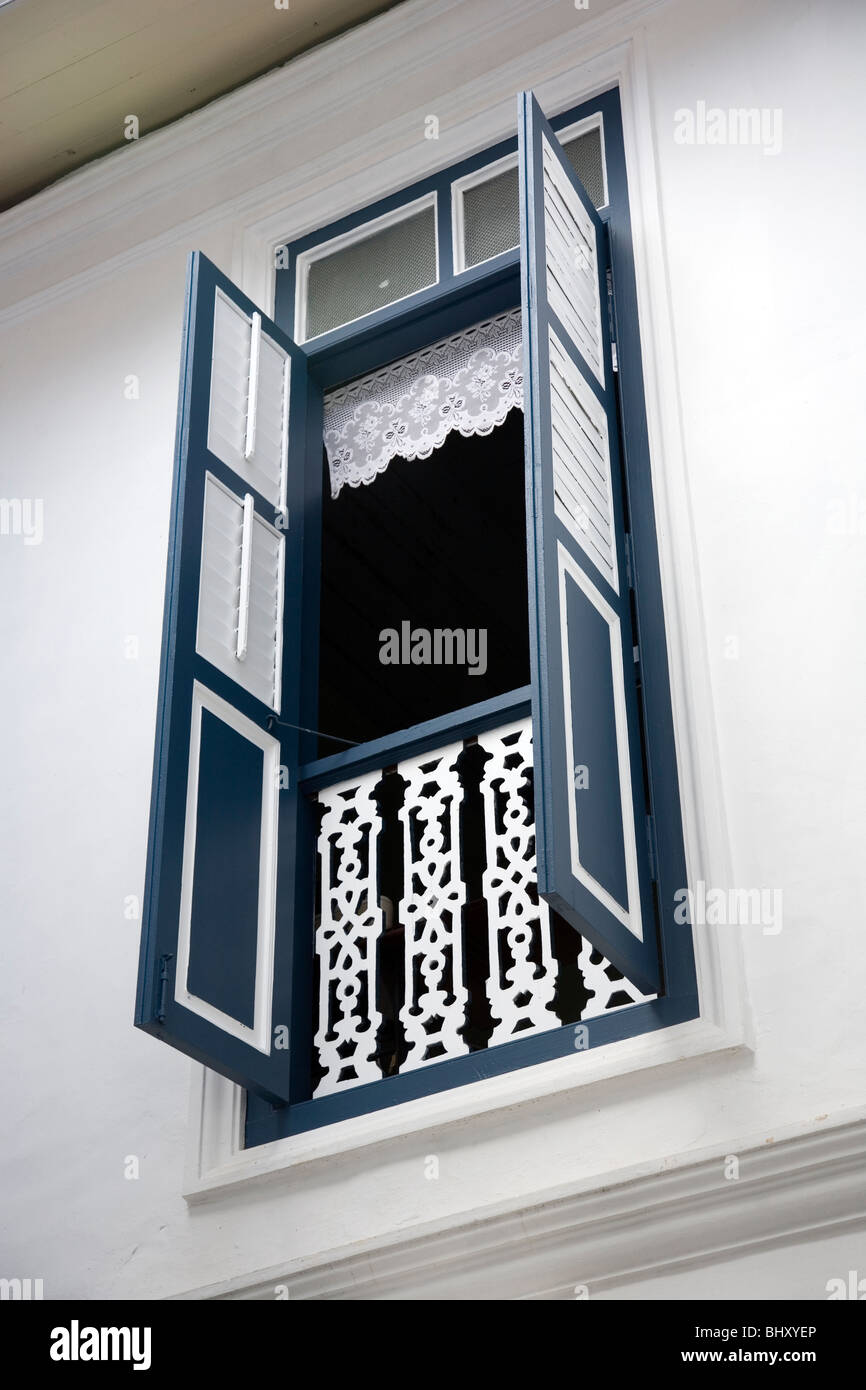 Window with lace curtain and shutters Stock Photo - Alamy