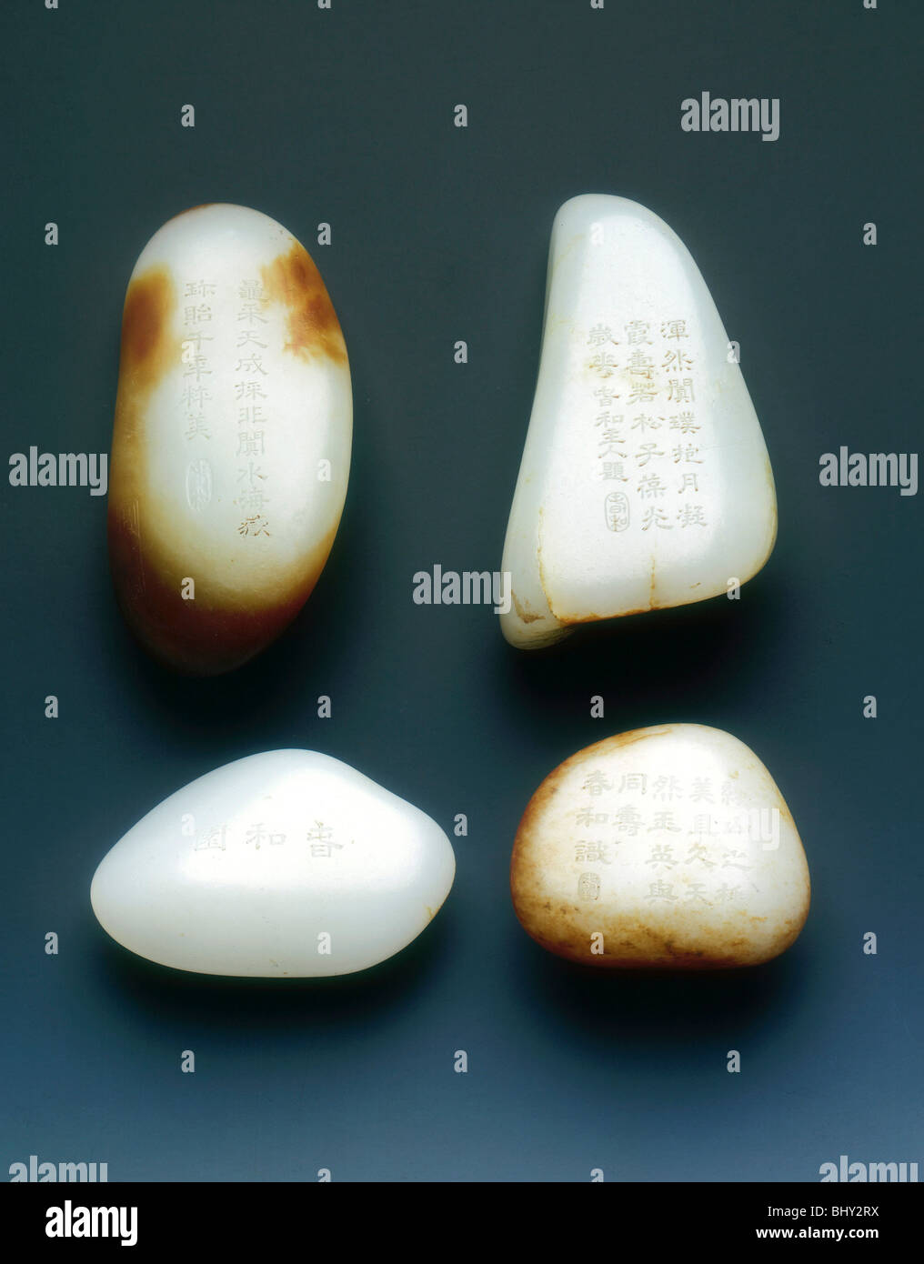 Set of four jade pebble paper weights, Qing dynasty, China, probably ...