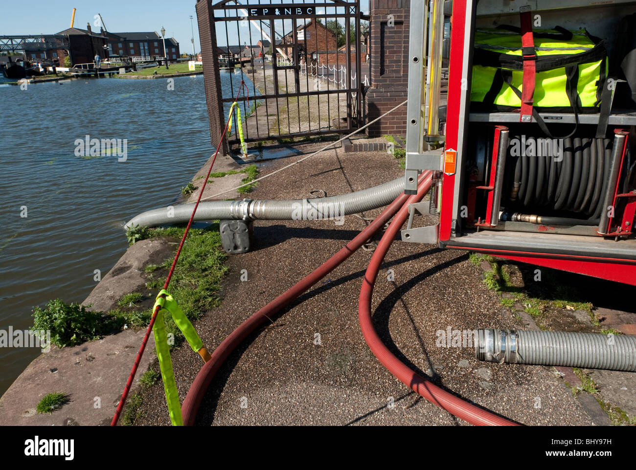 Fire engine suction hose from open water feed Stock Photo - Alamy