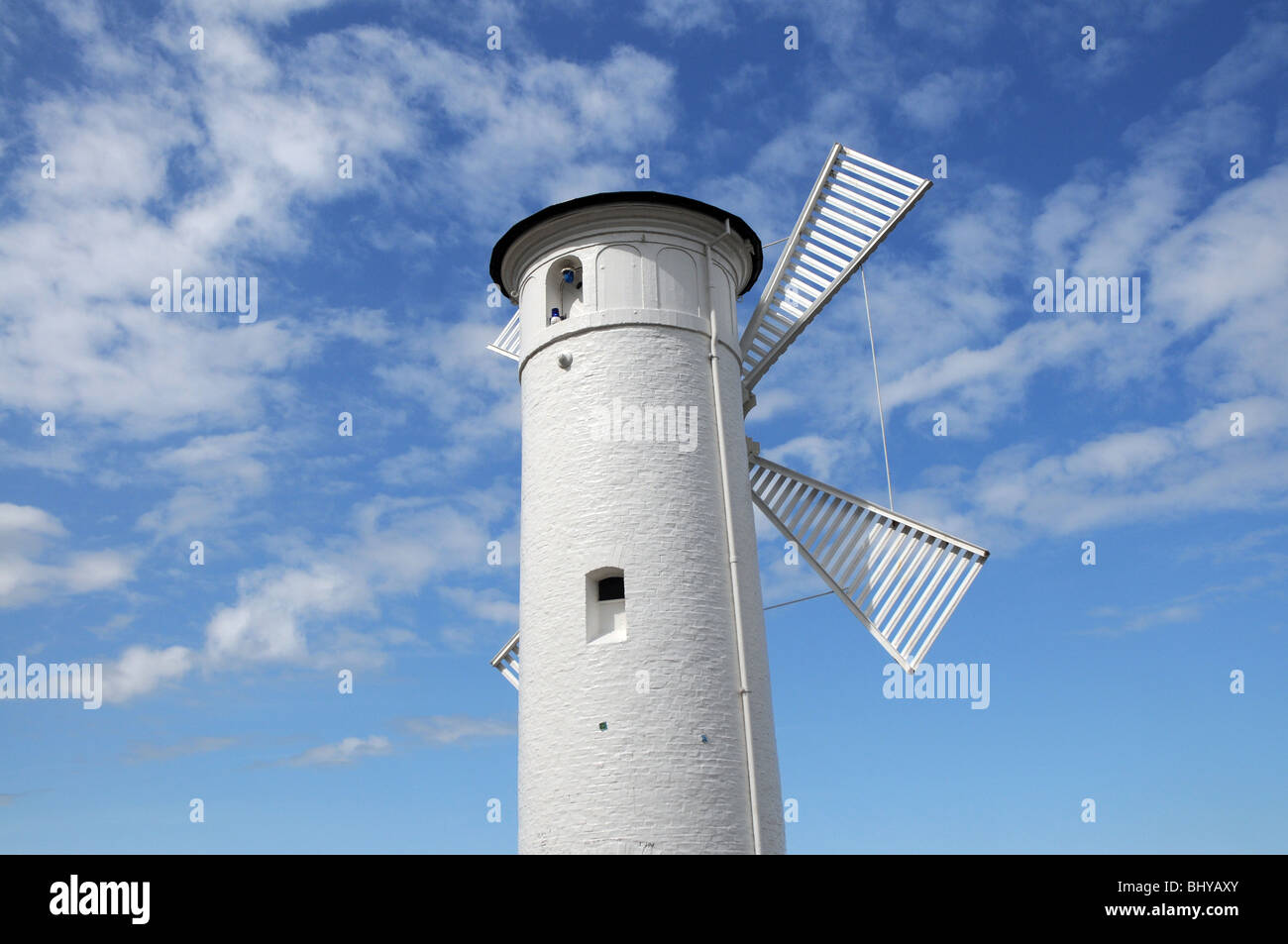 Beacon "Windmill" on stone pier next to port entry in Swinoujscie at ...