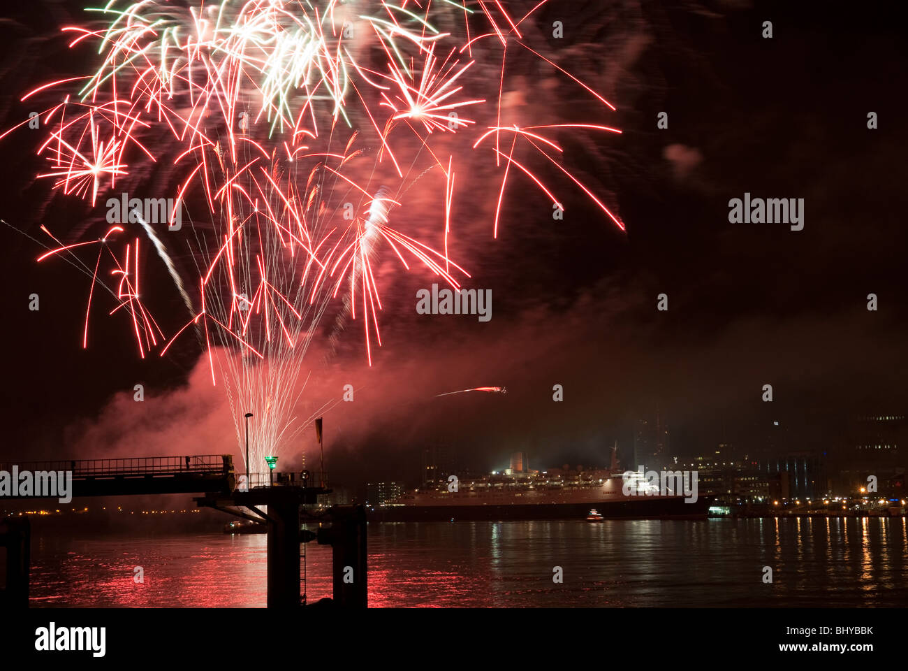 Liverpool Skyline at night with fireworks - QE2 leaving mersey Stock ...