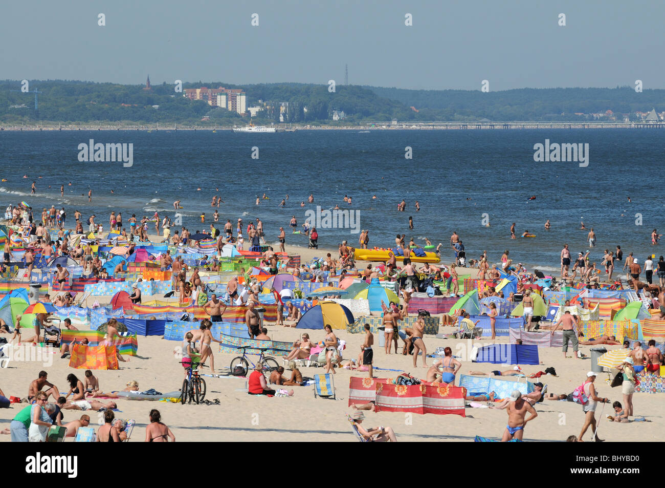 Full of tourists Baltic Sea beach in Swinoujscie, Poland. German ...