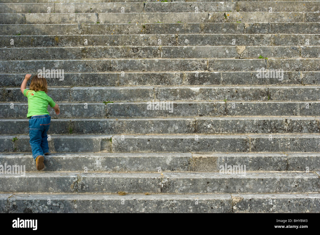 Girl climbing stairs hi-res stock photography and images - Alamy
