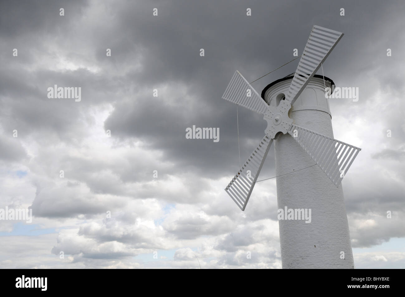 Beacon "Windmill" on stone pier next to port entry in Swinoujscie at ...