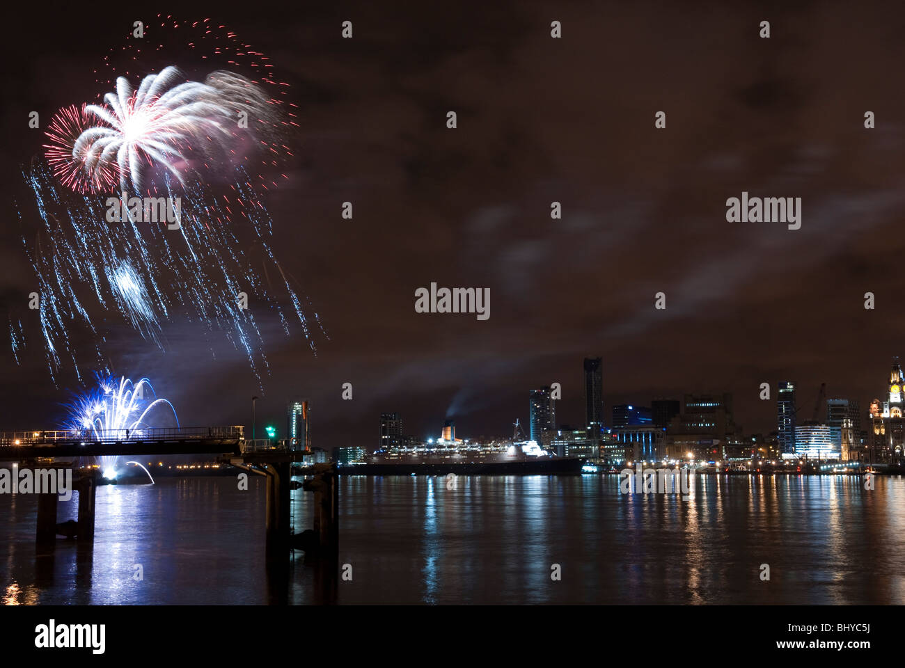 Liverpool Skyline at night with fireworks Stock Photo - Alamy