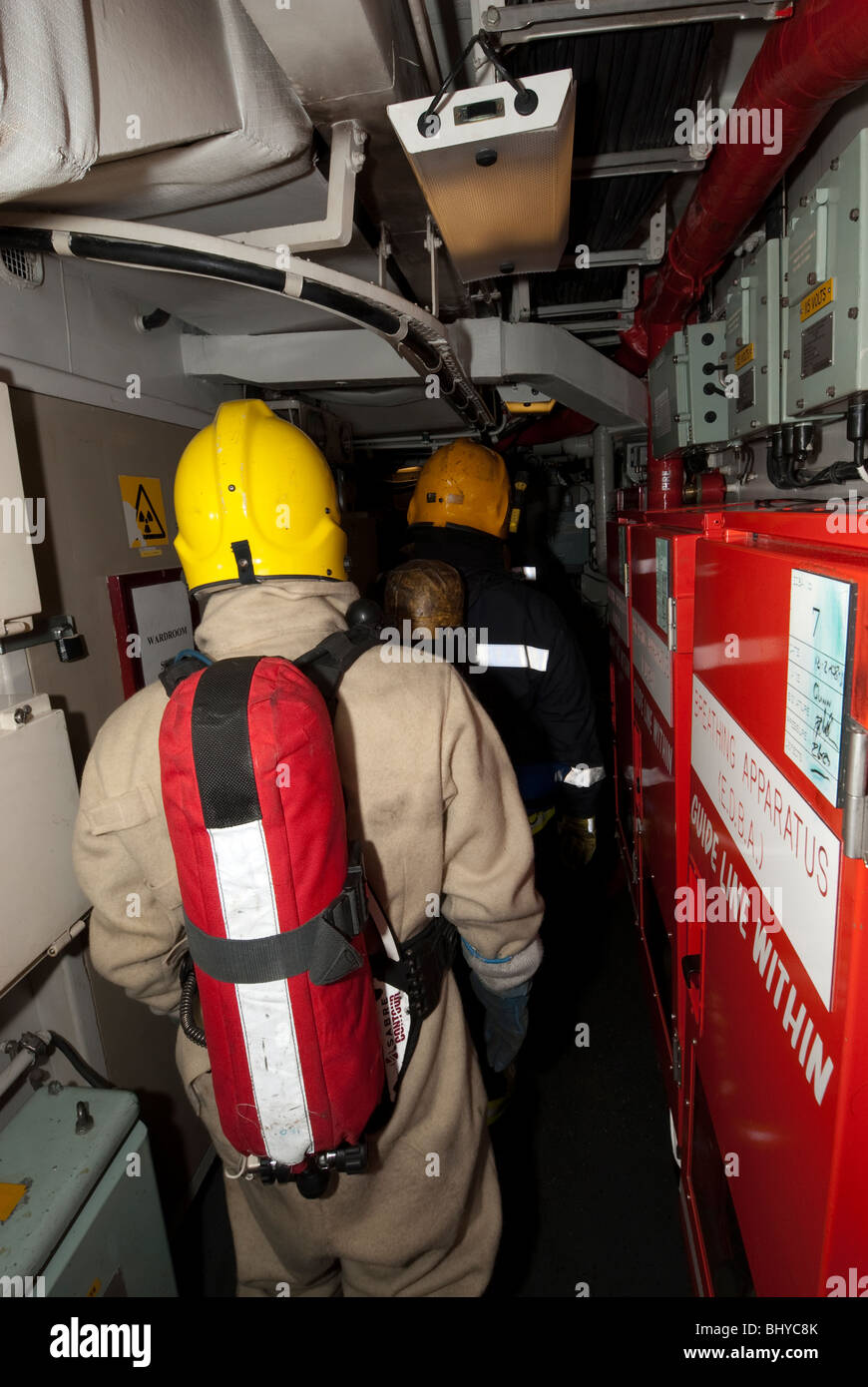 Firemen in BA practice ships firefighting Stock Photo - Alamy