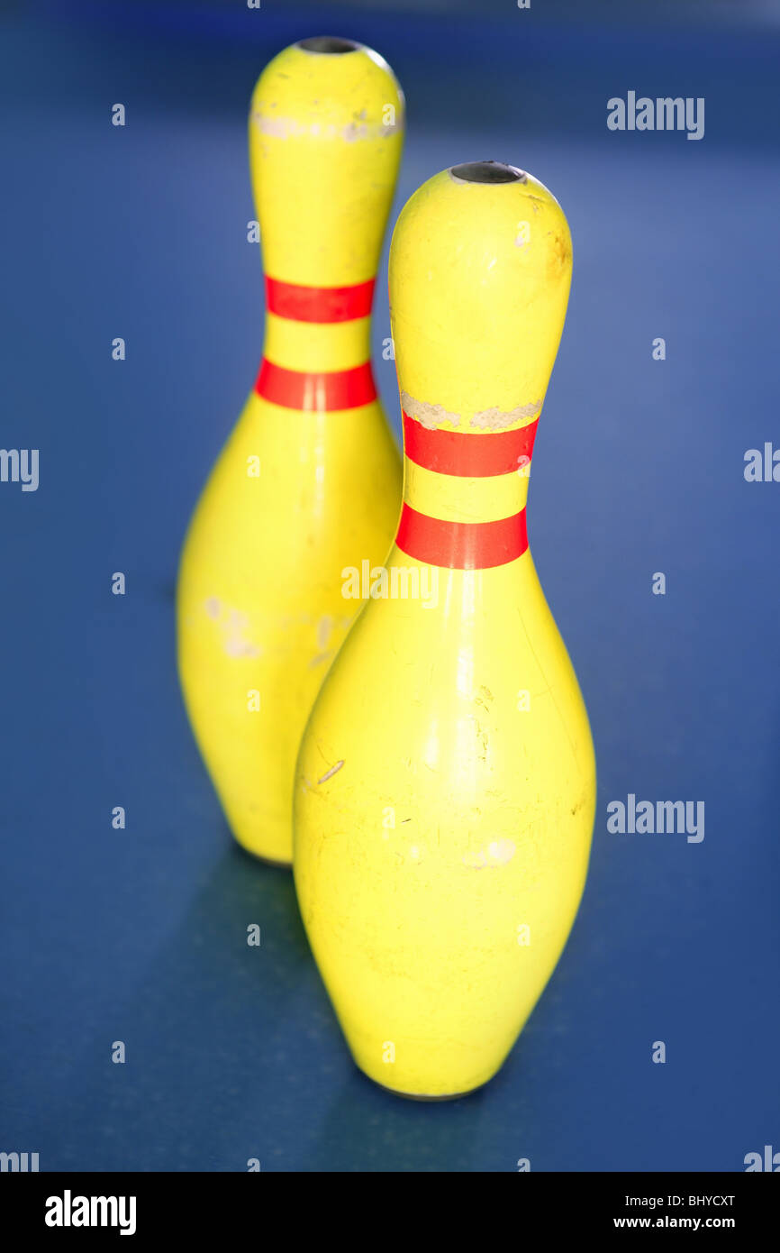 Bowling in yellow color still life blue background image Stock Photo ...