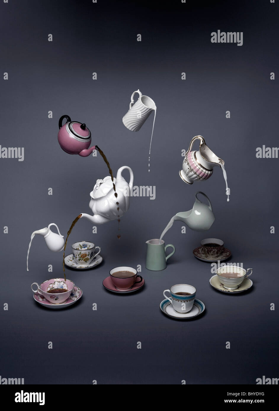dancing teapots, pouring tea Stock Photo - Alamy