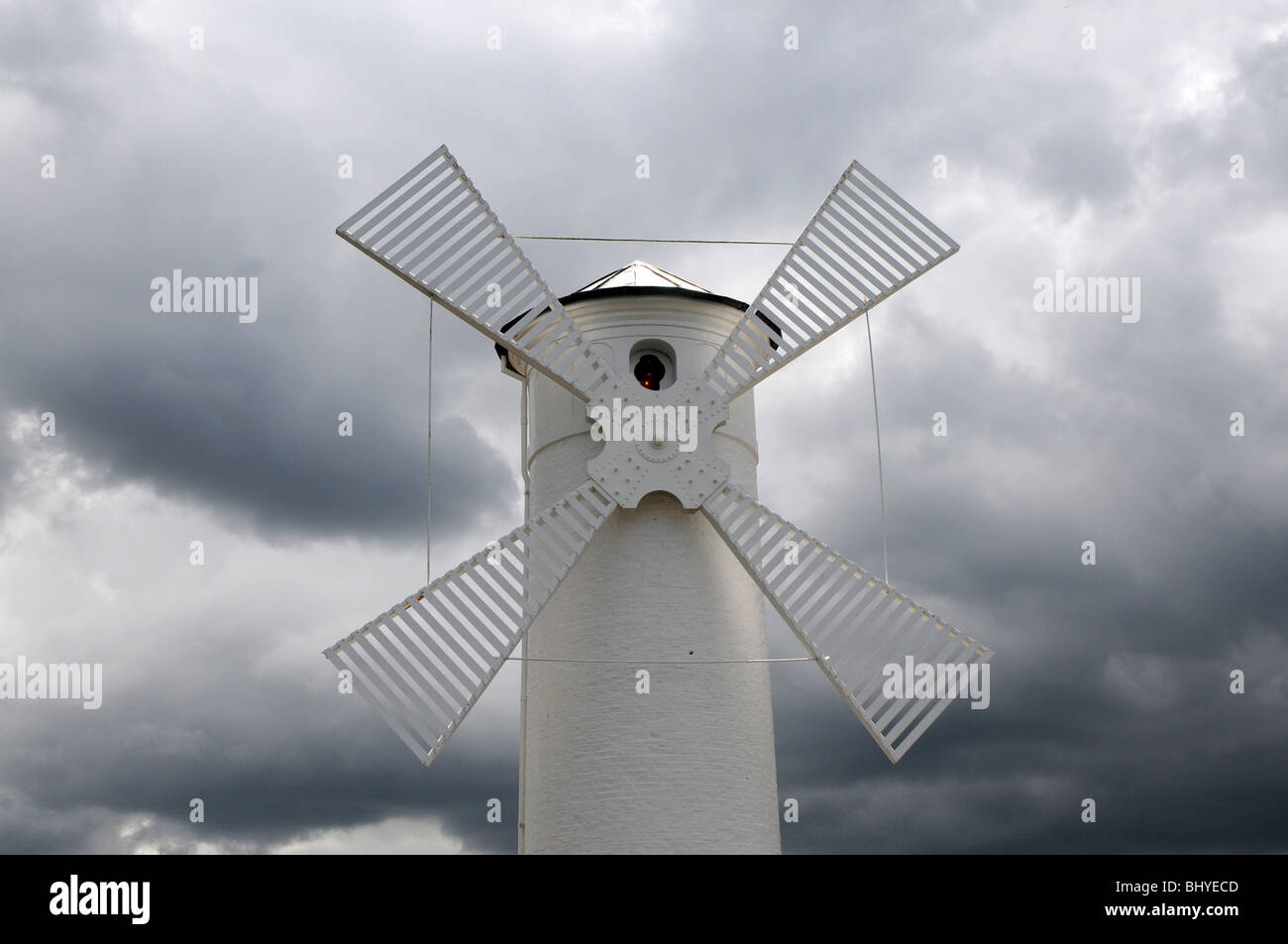Beacon "Windmill" on stone pier next to port entry in Swinoujscie at ...