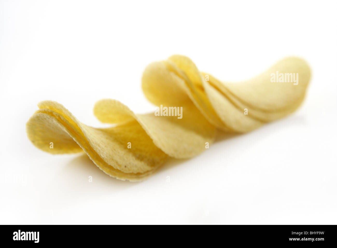 Potato salted chips slices over white background Stock Photo - Alamy