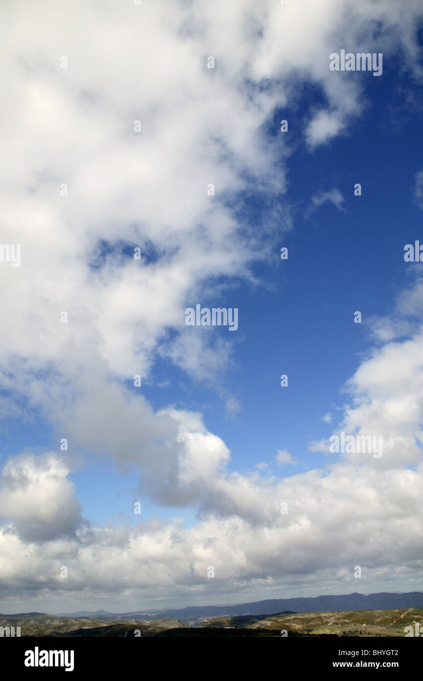Blue sunny sky with white clouds in daytime, nature Stock Photo - Alamy