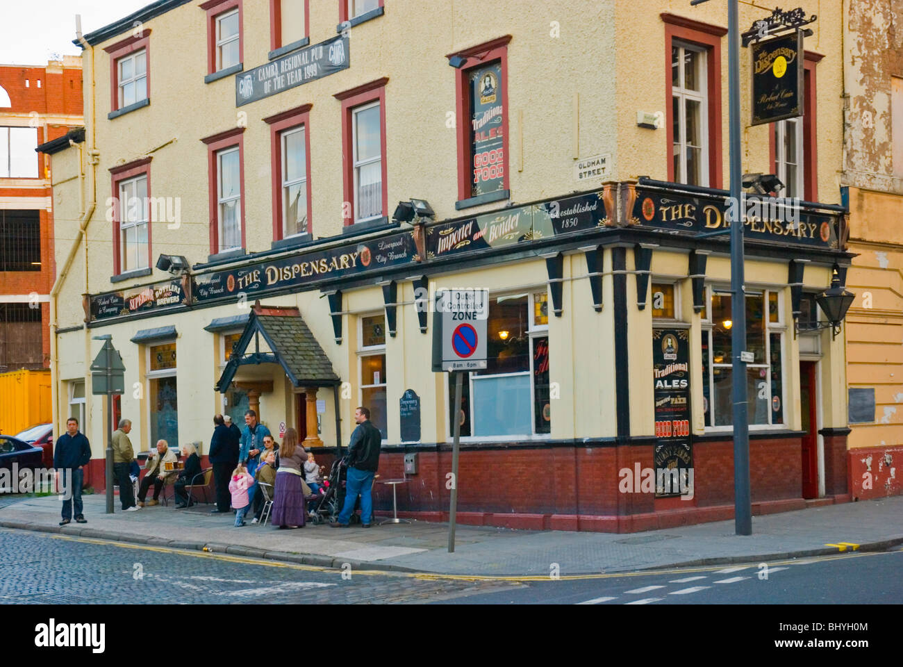 People outside a pub along Oldman street in central Liverpool England ...
