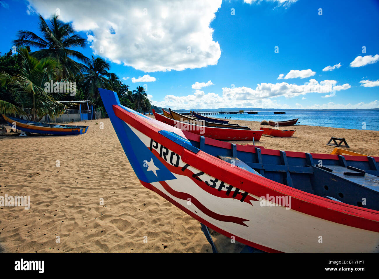 Painted Traditional Boats on a Beach, Puerto Rico Stock Photo - Alamy