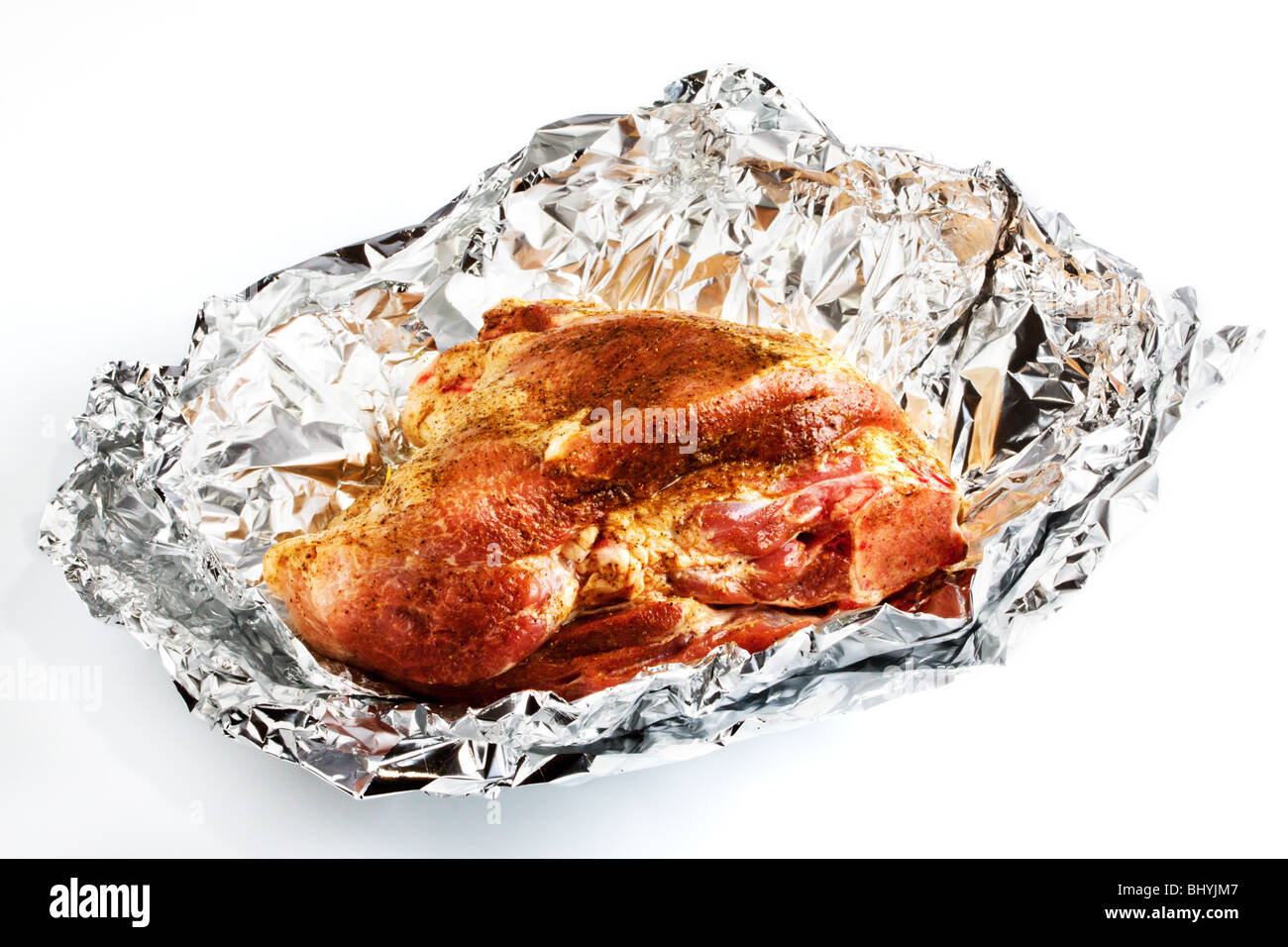 Pork shin in spices on a white background Stock Photo - Alamy
