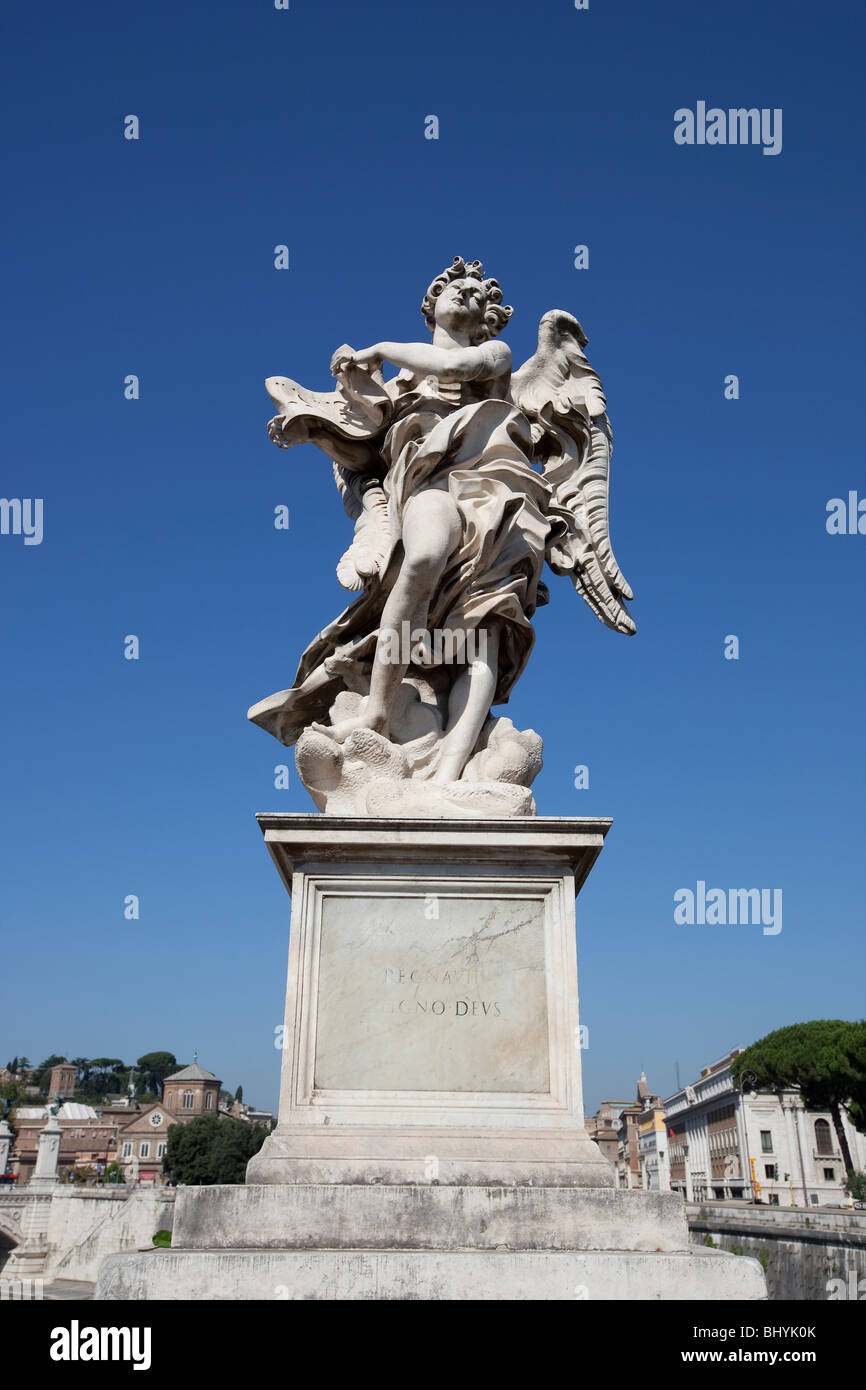 Angel figure with a scroll Stock Photo - Alamy
