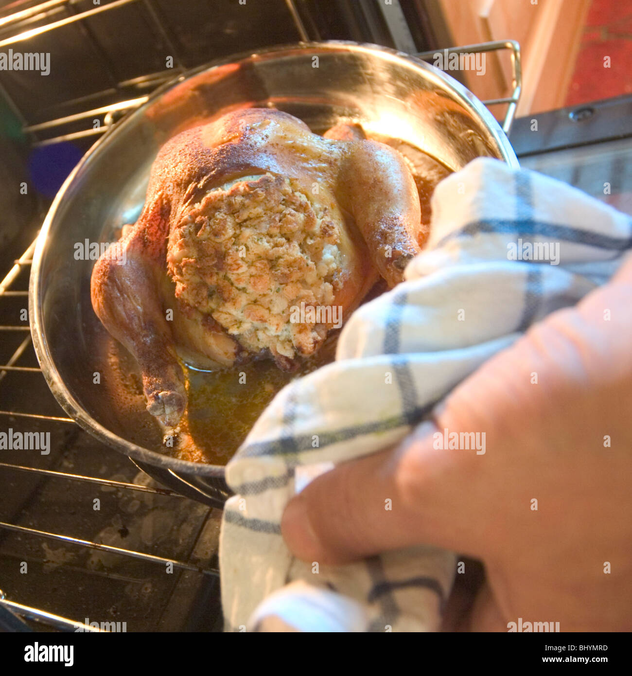 Frying pan with chicken Stock Photo - Alamy