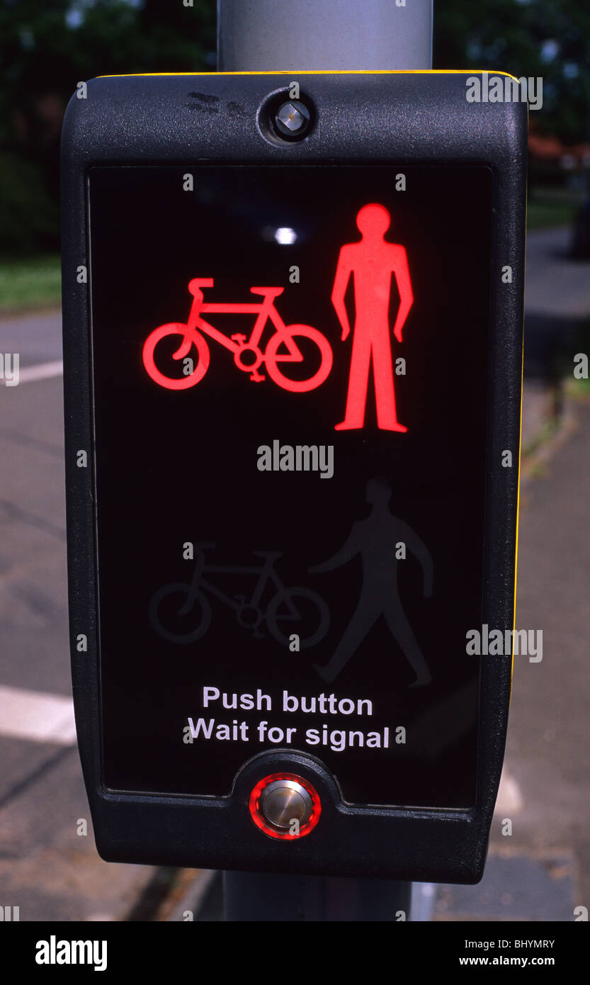 red stop warning symbols for pedestrians and cyclists at road crossing ...
