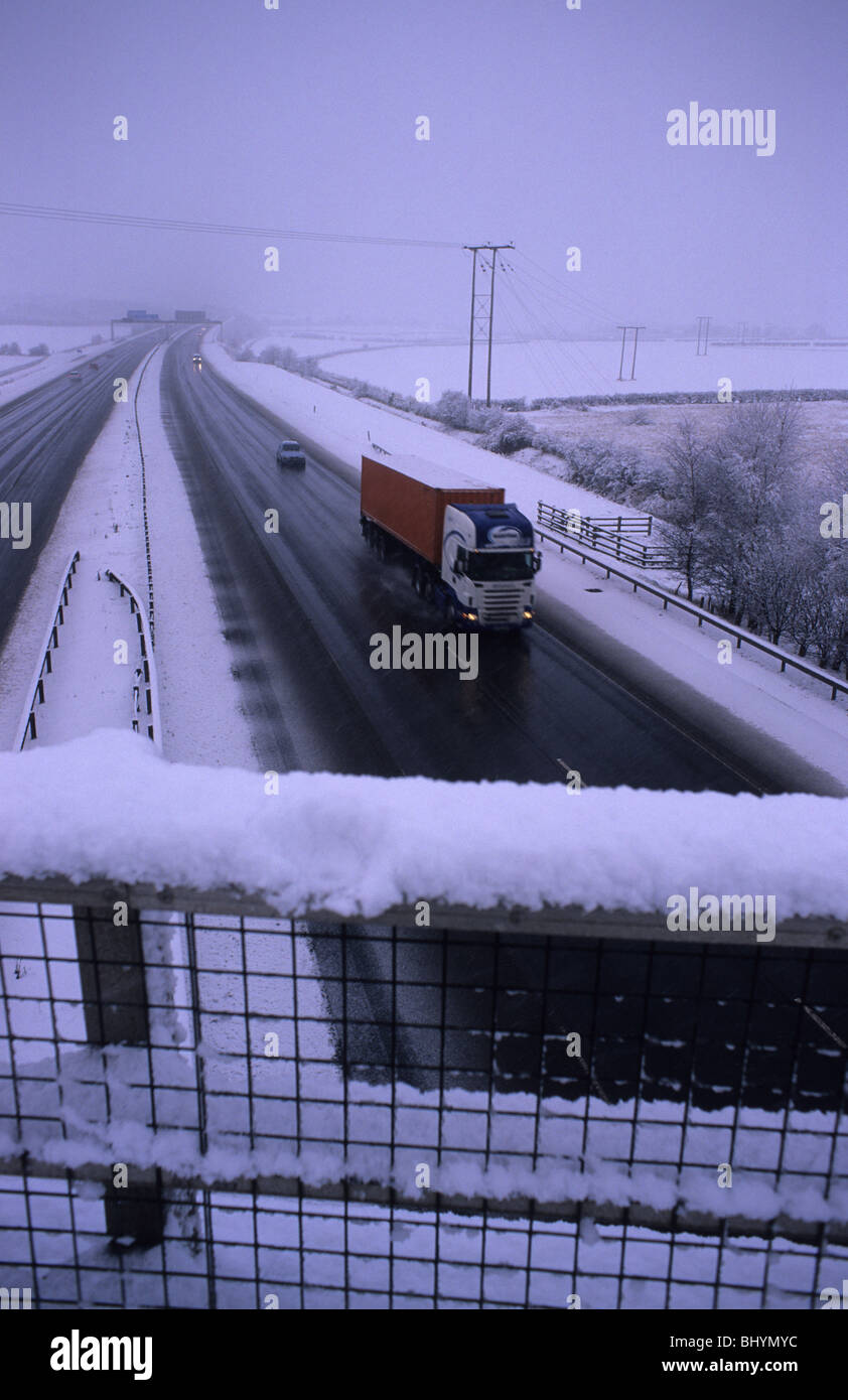 lorry struggling through winter snow on M1/A1 motorway near leeds ...