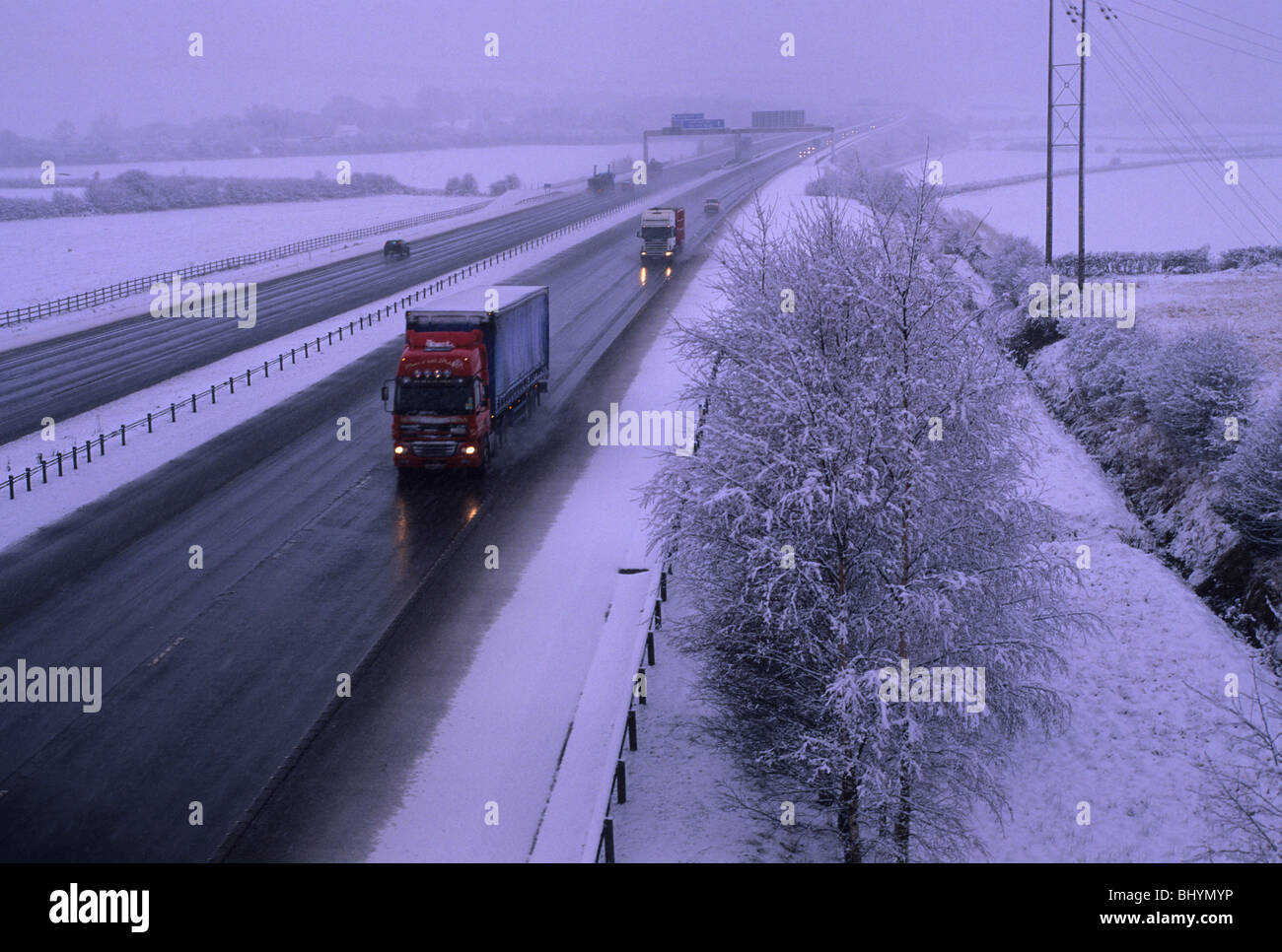 lorry struggling through winter snow on M1/A1 motorway near leeds ...