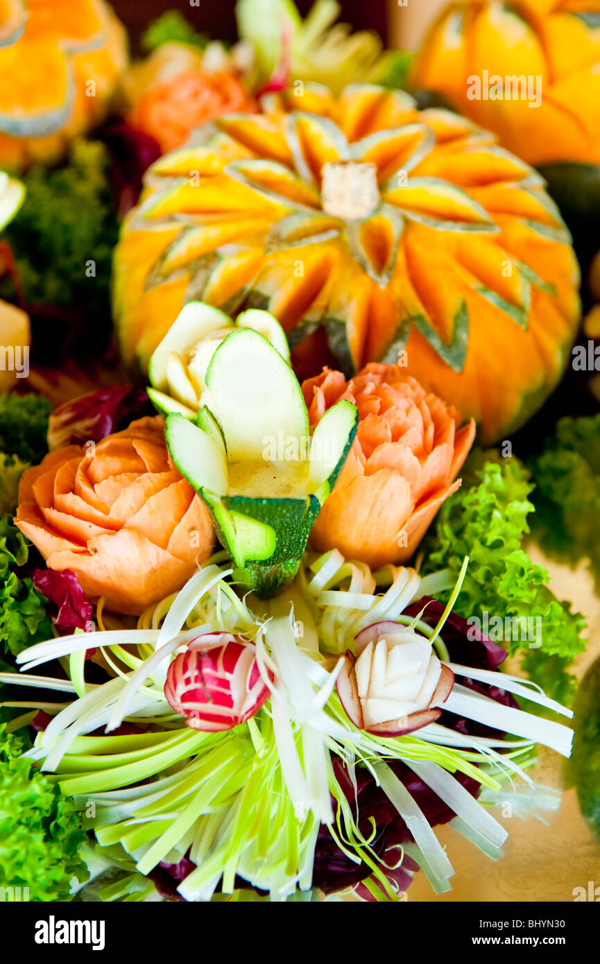 Trimmed vegetables shaped like flowers Stock Photo - Alamy