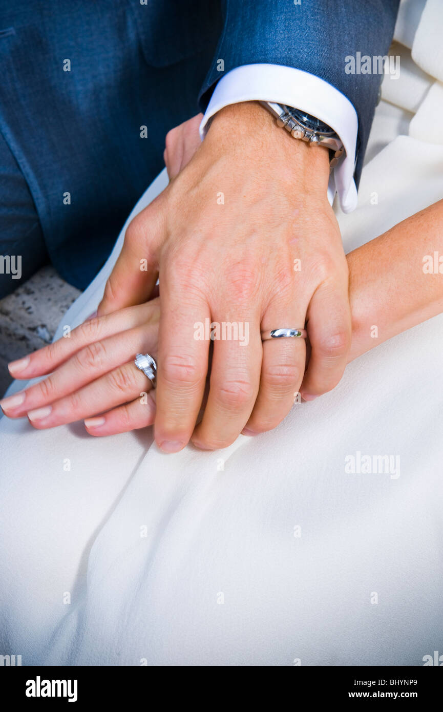 Cropped image couple hands wedding hi-res stock photography and images ...
