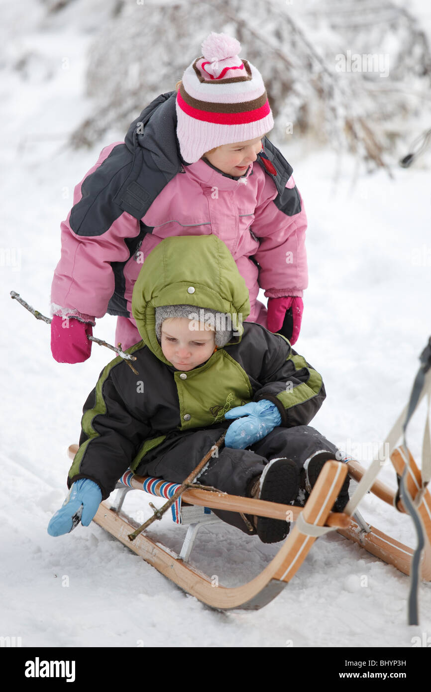 children on sled Stock Photo - Alamy