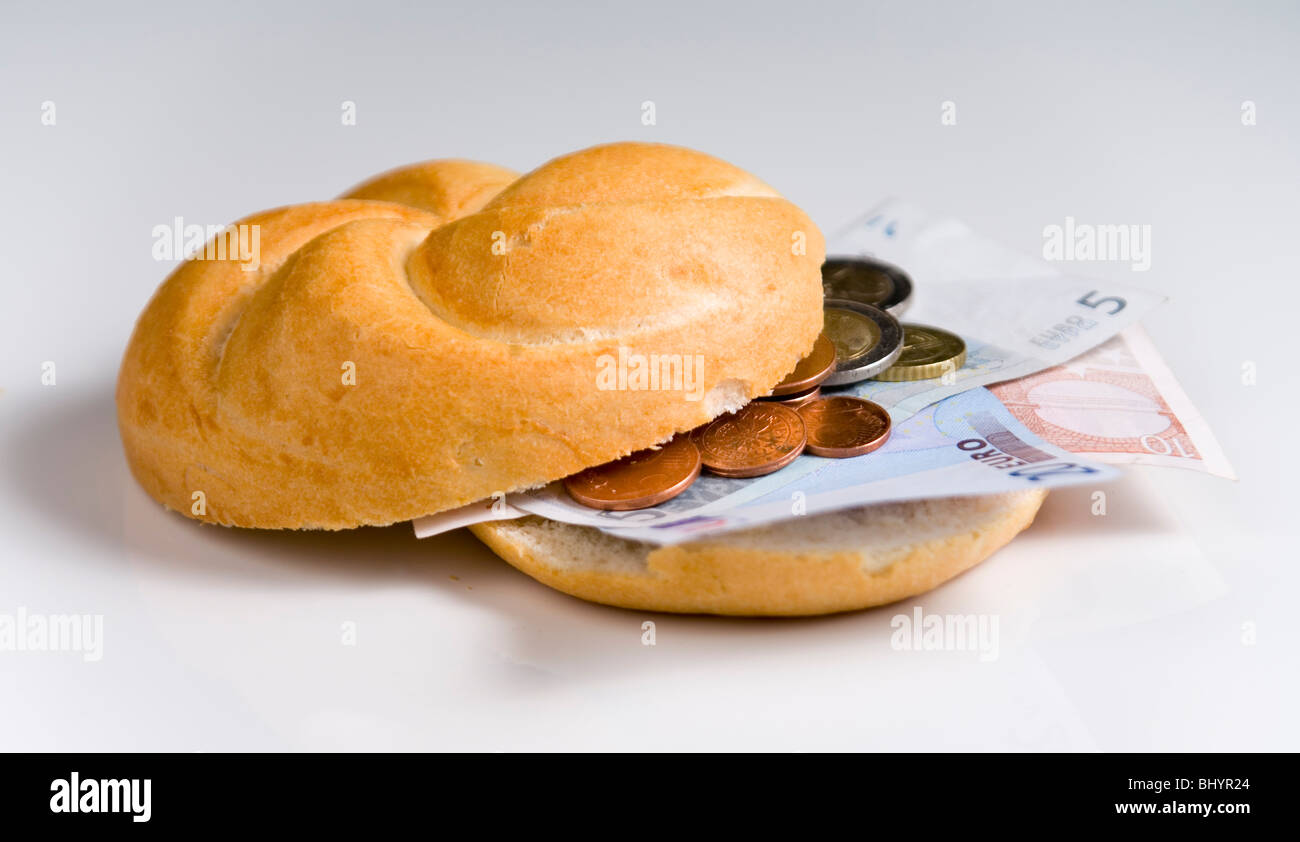 bun with coins Stock Photo - Alamy
