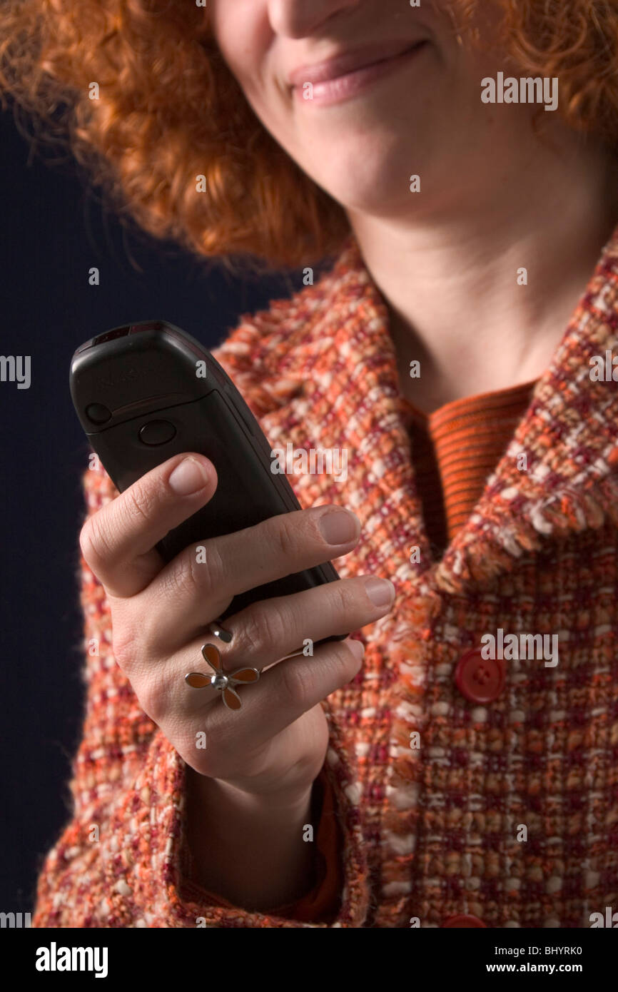 woman with handy Stock Photo - Alamy